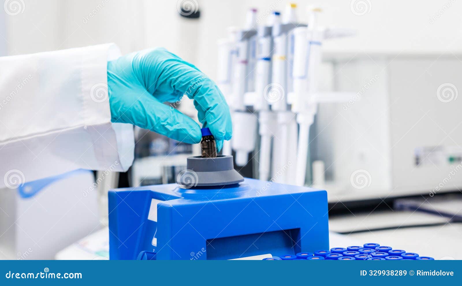 Close Up of a Woman Shaking Samples Using a Vortex Mixer before HPLC ...