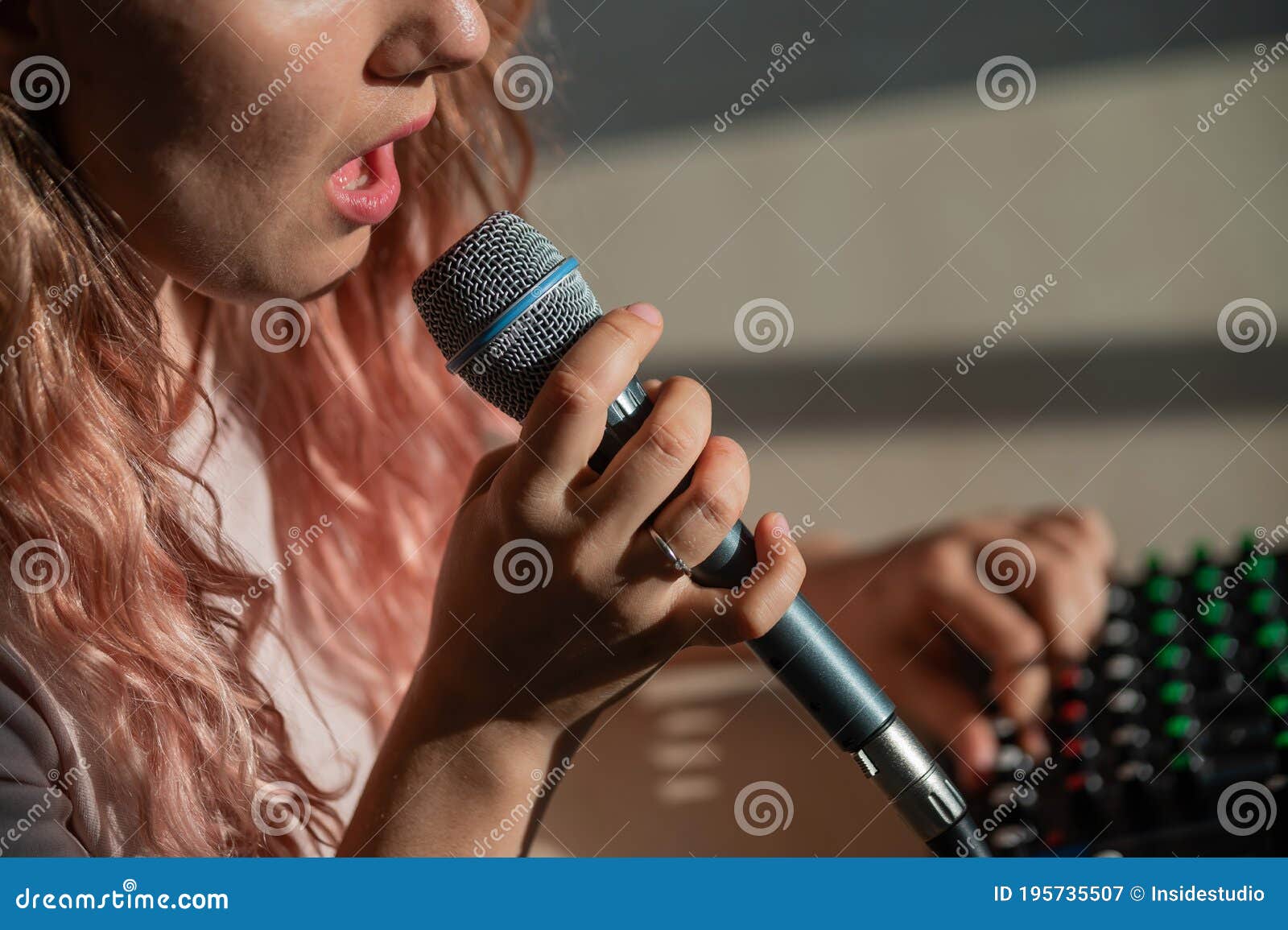 Close-up of a Woman Singing into a Microphone. Stock Image - Image of ...