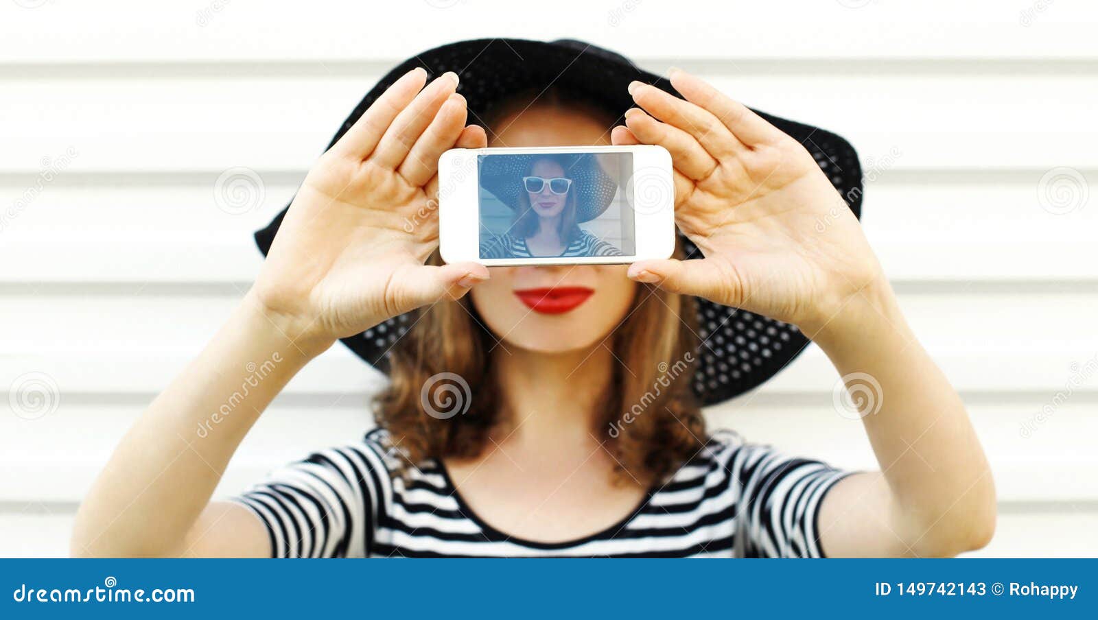 Close Up Selfie Shot Of Smiling Pretty Young Woman In Light Clothes