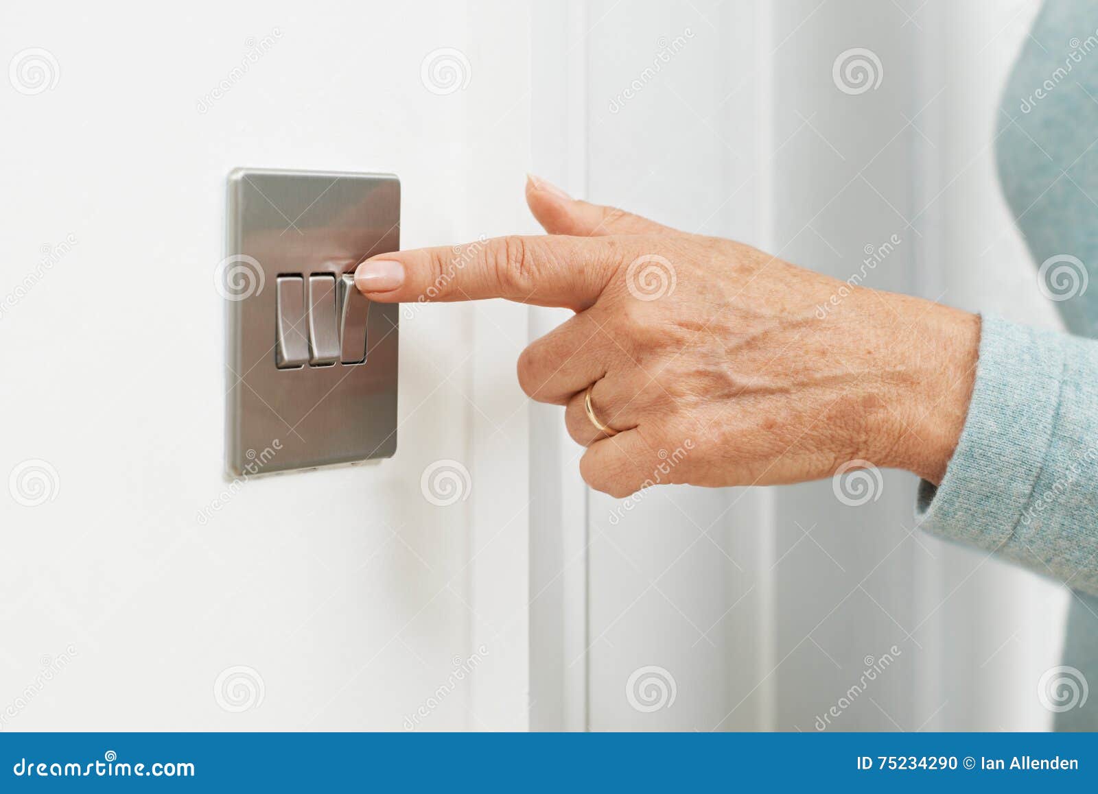 Close Up of Woman Turning Off Light Switch Stock Photo - Image of woman ...