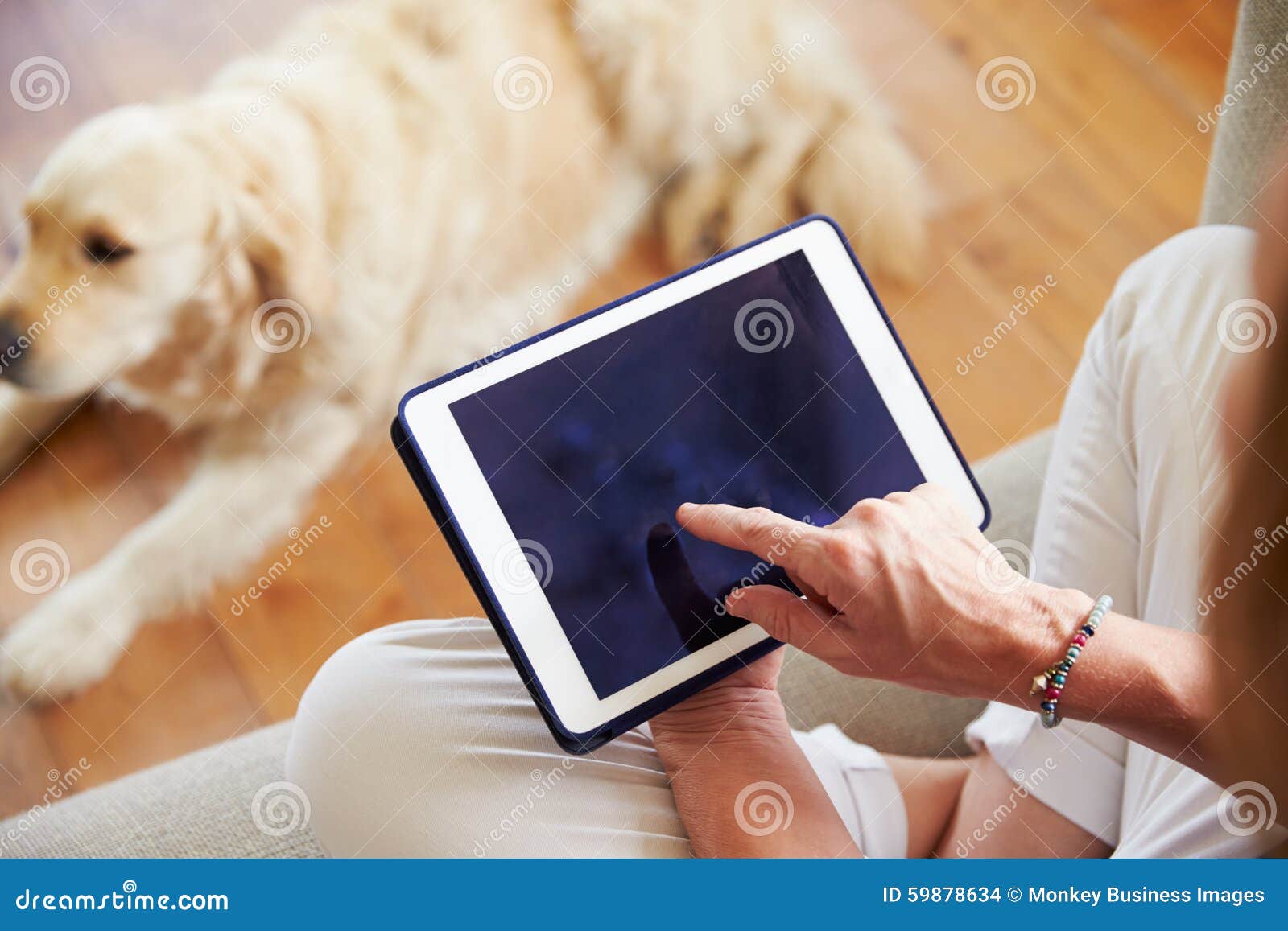 Close Up of Woman Using Digital Tablet at Home Stock Photo - Image of ...