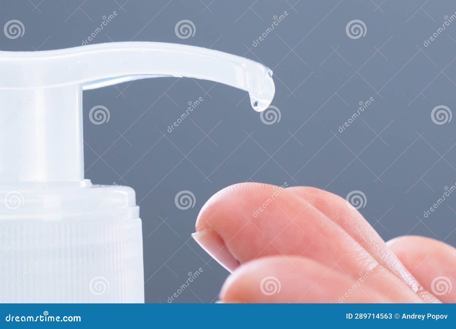 Woman Using Rubbing Alcohol Stock Image - Image of dispenser, woman ...