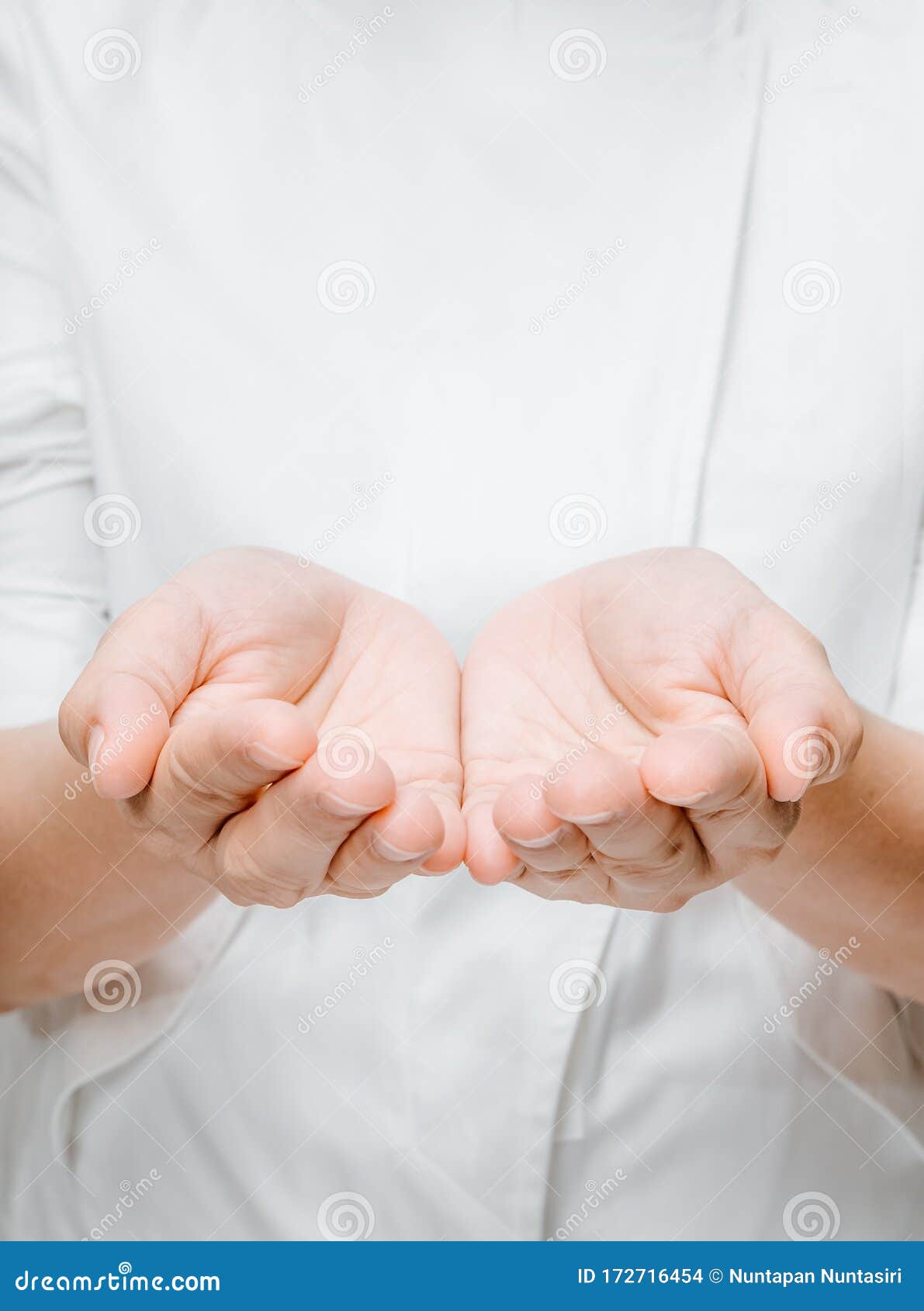 Close Up Of Man`s Cupped Hands Show Something On White Background ...