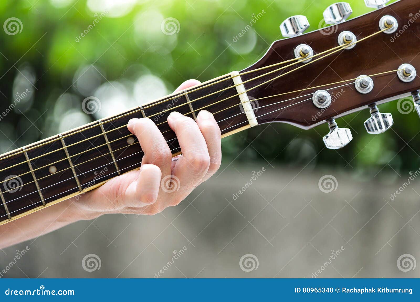 A Close Up of Women Fingers Playing Guitar Stock Photo - Image of close ...