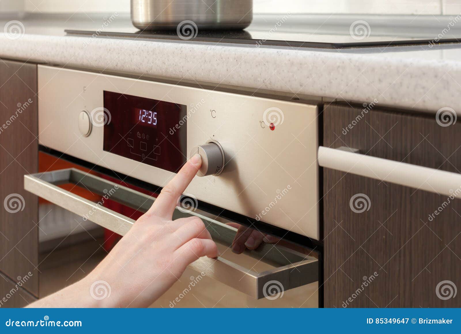 Close Up of Women Hand Setting Cooking Mode on Oven. Stock Image ...