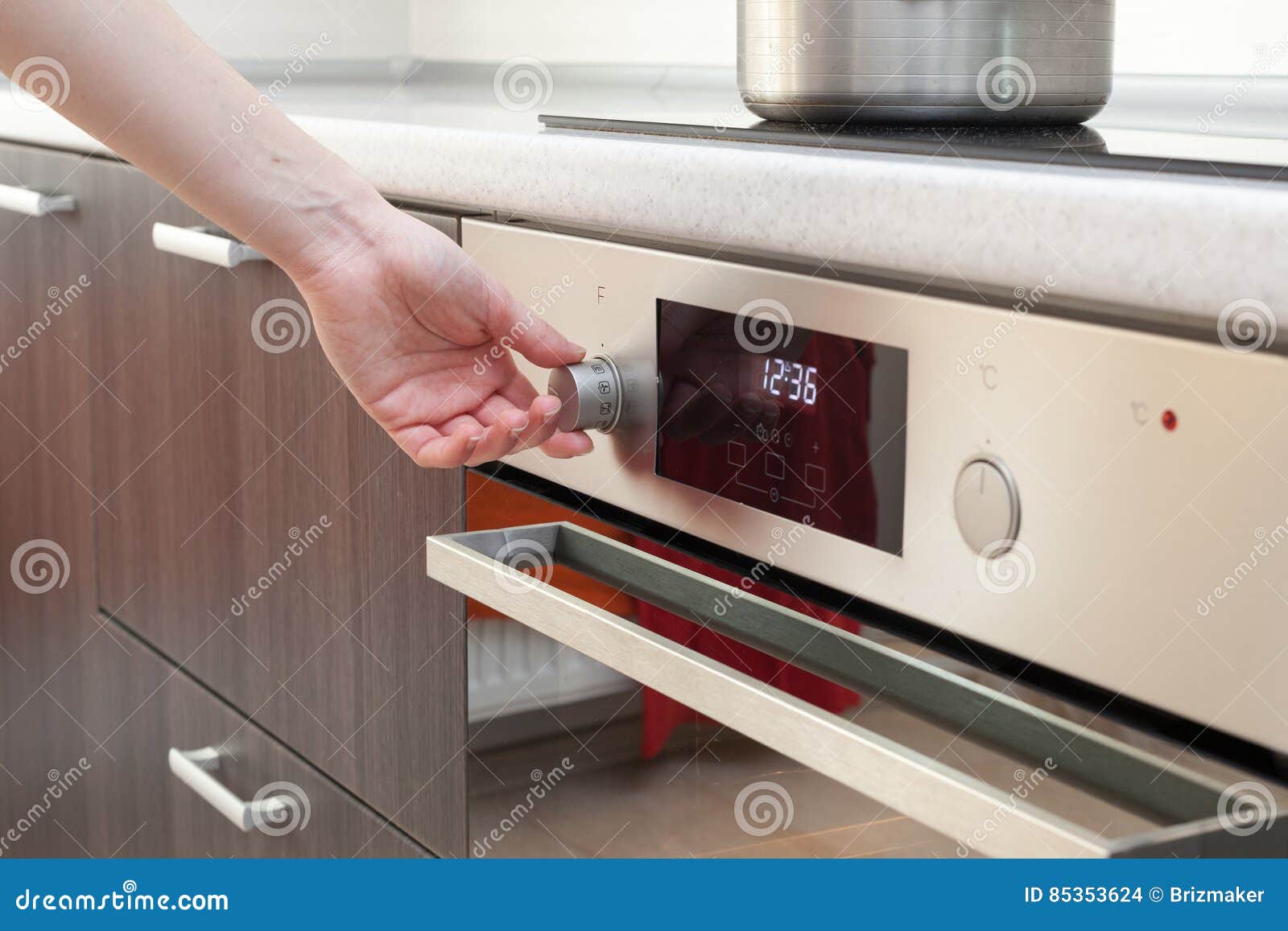 Close Up of Women Hand Setting Cooking Mode on Oven. Stock Photo ...