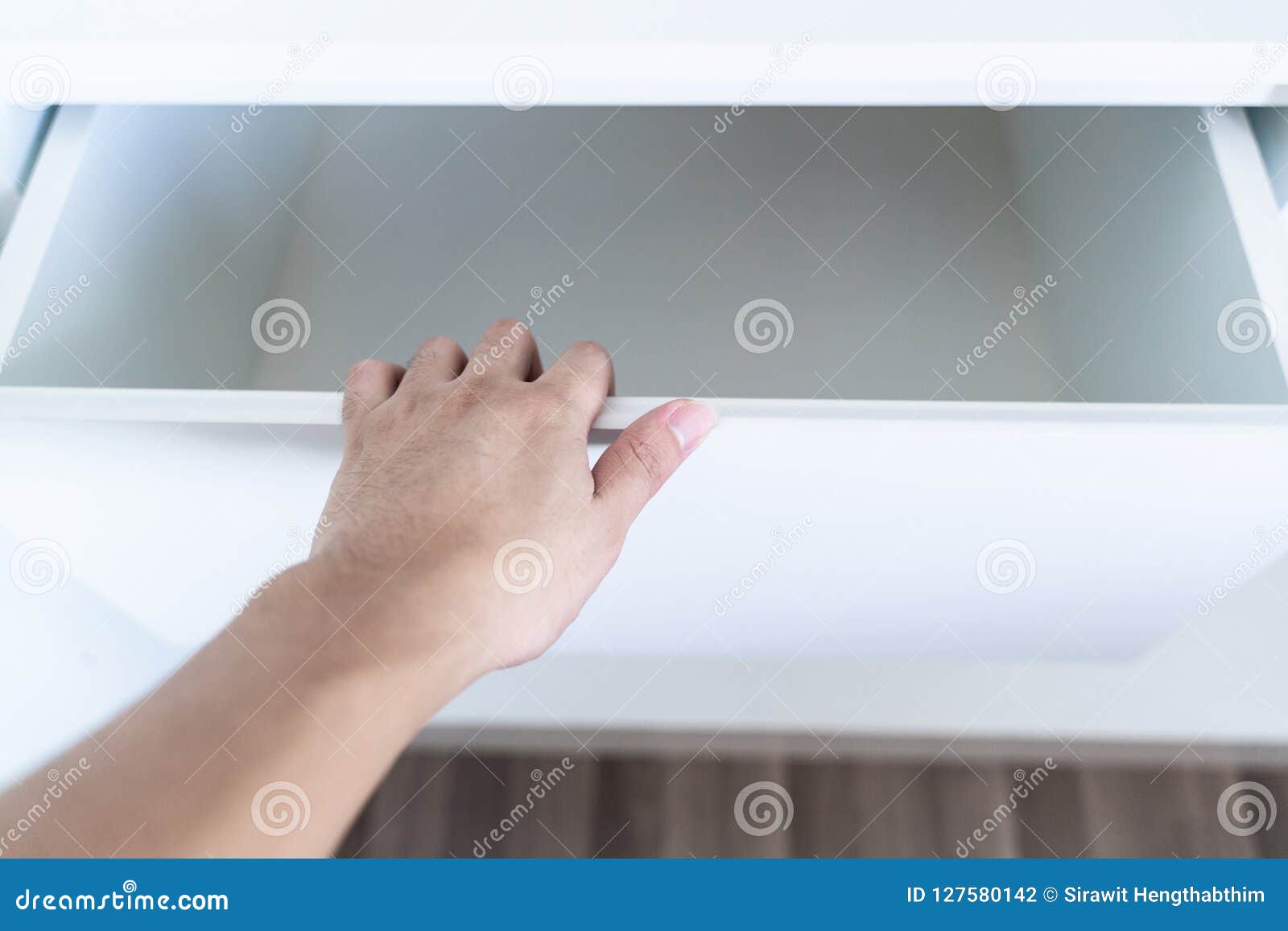Use Hand Pull Open Drawer stock photo. Image of female - 127580142