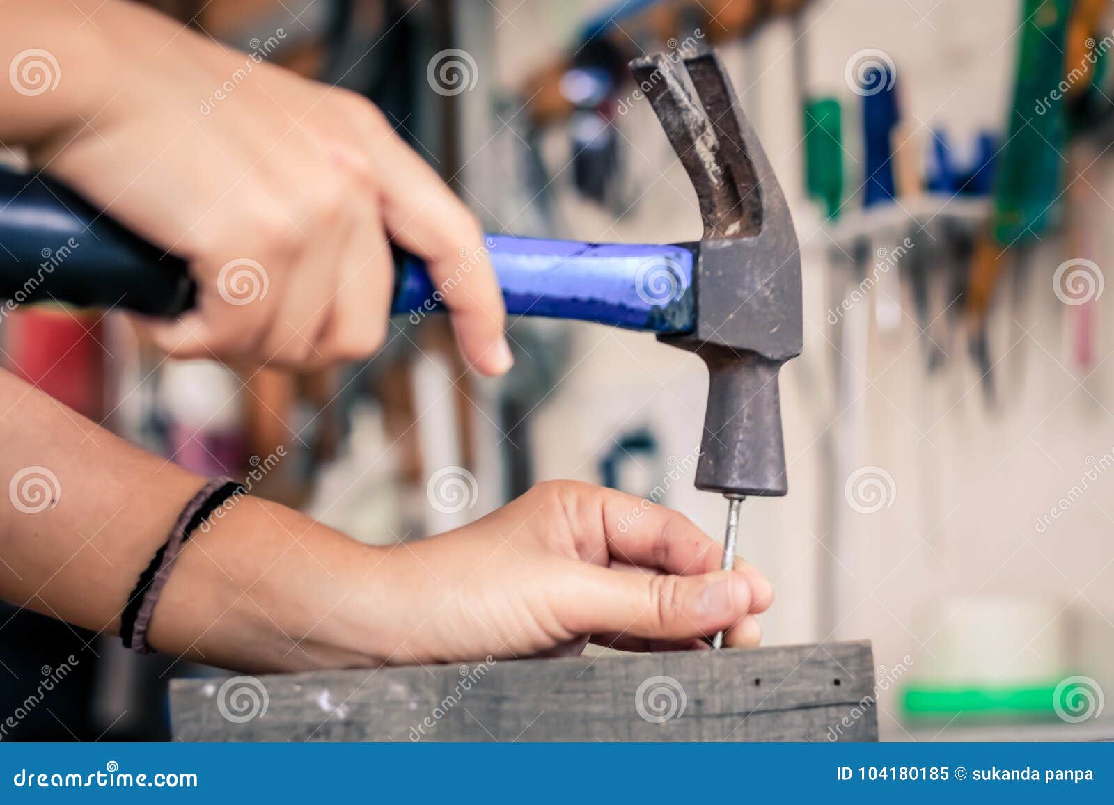 Close Up Worker Hammering Nail into Wood, Vintage Style Stock Image ... Close Up Worker Hammering Nail into Wood, Vintage Style Stock Image ...