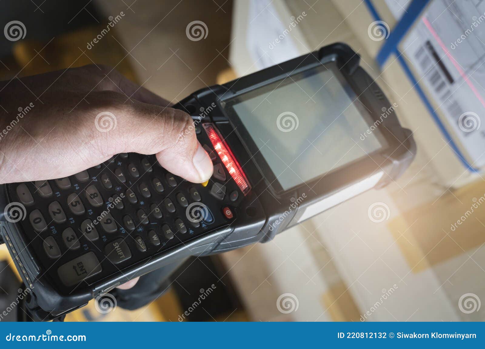 Close-up Worker Scanning Barcode Scanner with Cargo Shipment . Computer ...