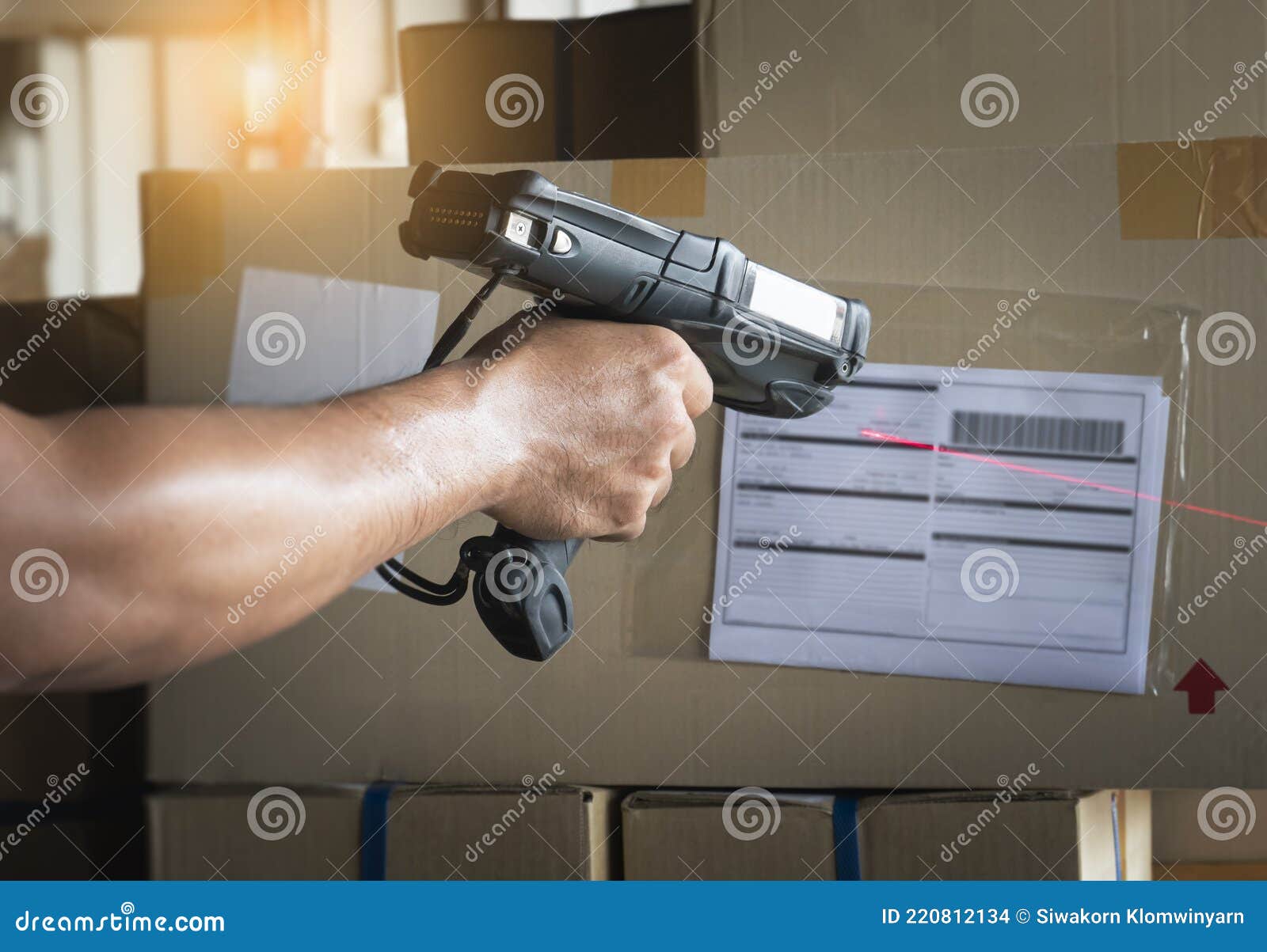 Close-up Worker Scanning Barcode Scanner with Package Boxes. Shipment ...
