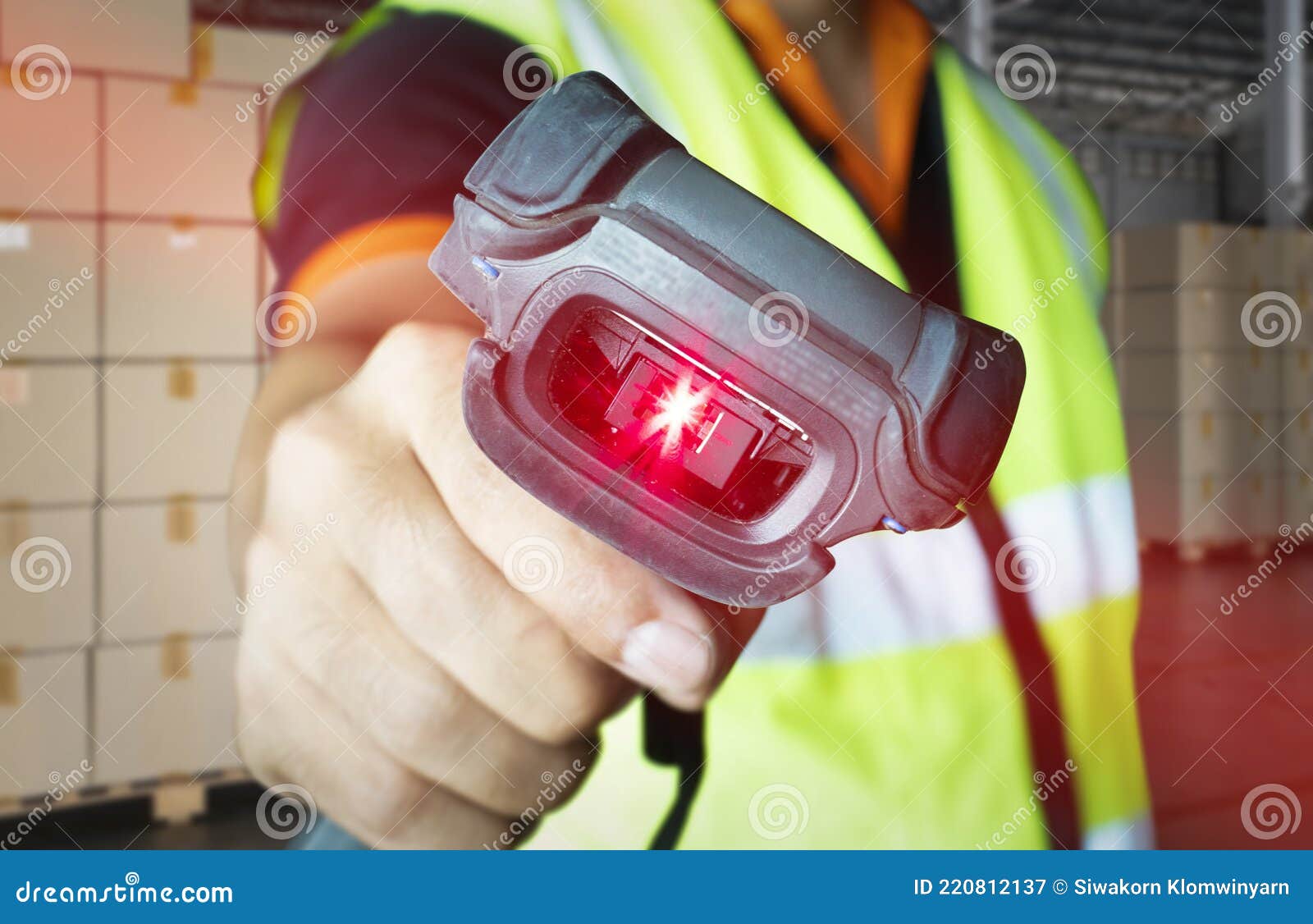 Close-up Worker Scanning Barcode Scanner with Red Laser. Computer ...