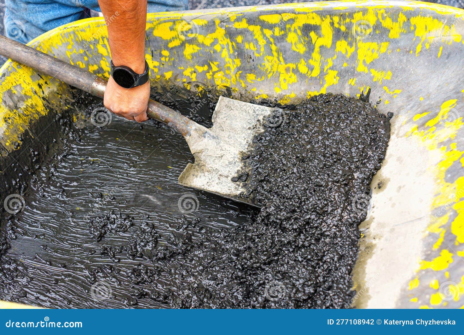 Worker Scooping Terrazzo Pavement from a Wheelbarrow Stock Photo ...
