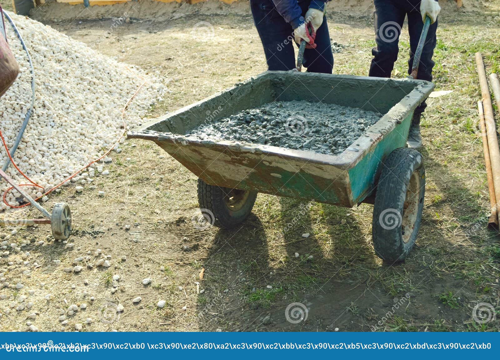 Workers are Dragging a Wheelbarrow with a Ready-made Solution Stock ...