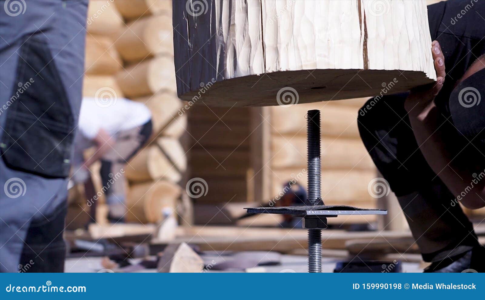 Close-up Workers Work With Logs At Construction Site. Clip. Builders ...