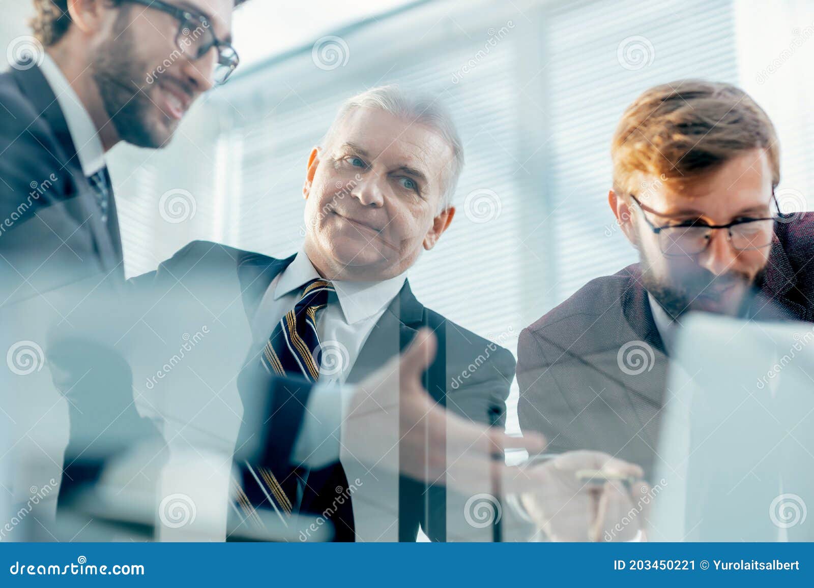 Close Up. Working Group Looking at the Monitors of Office Computers ...