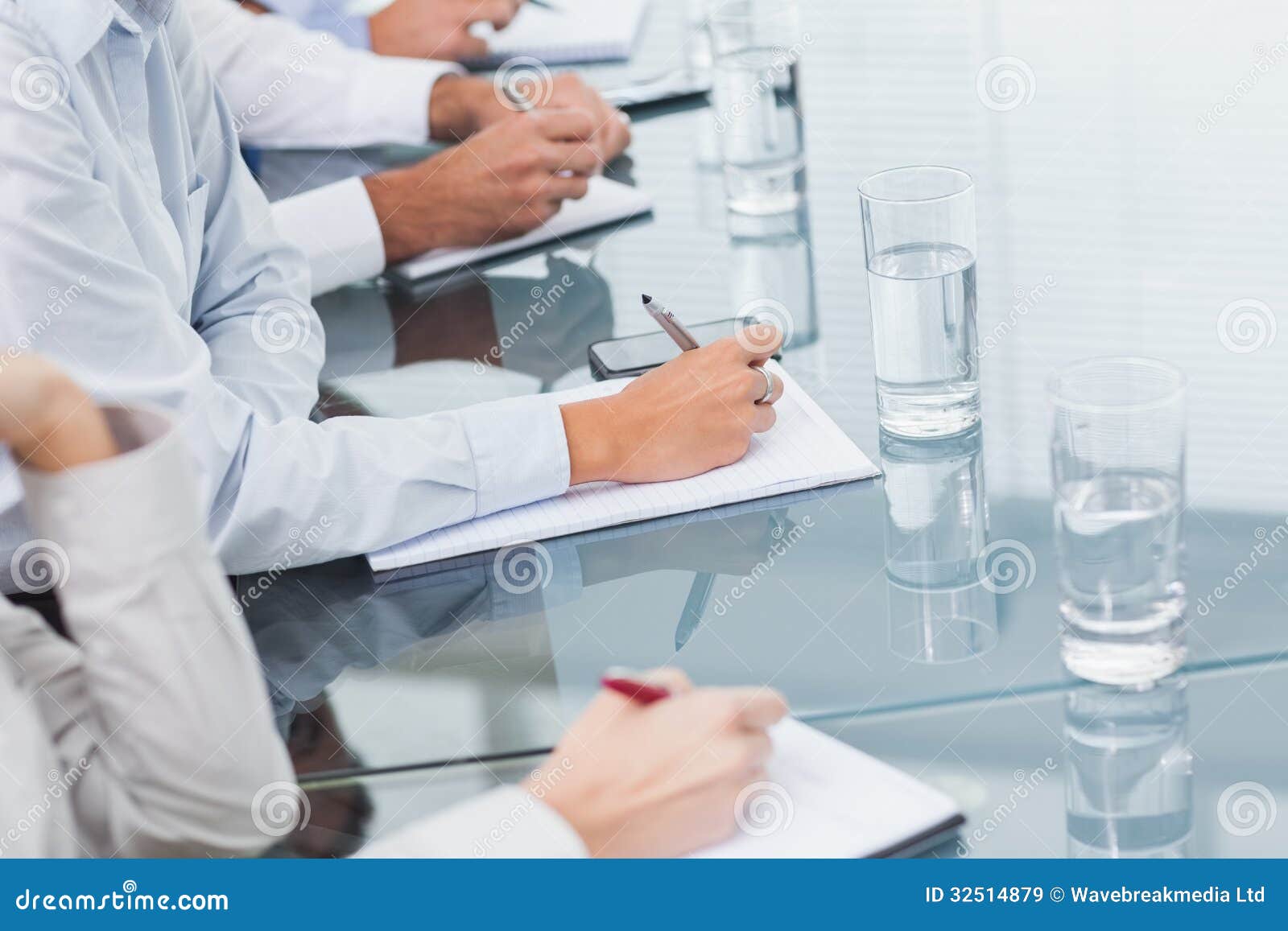 Close Up on Workmates Hands Taking Notes during Presentation Stock ...