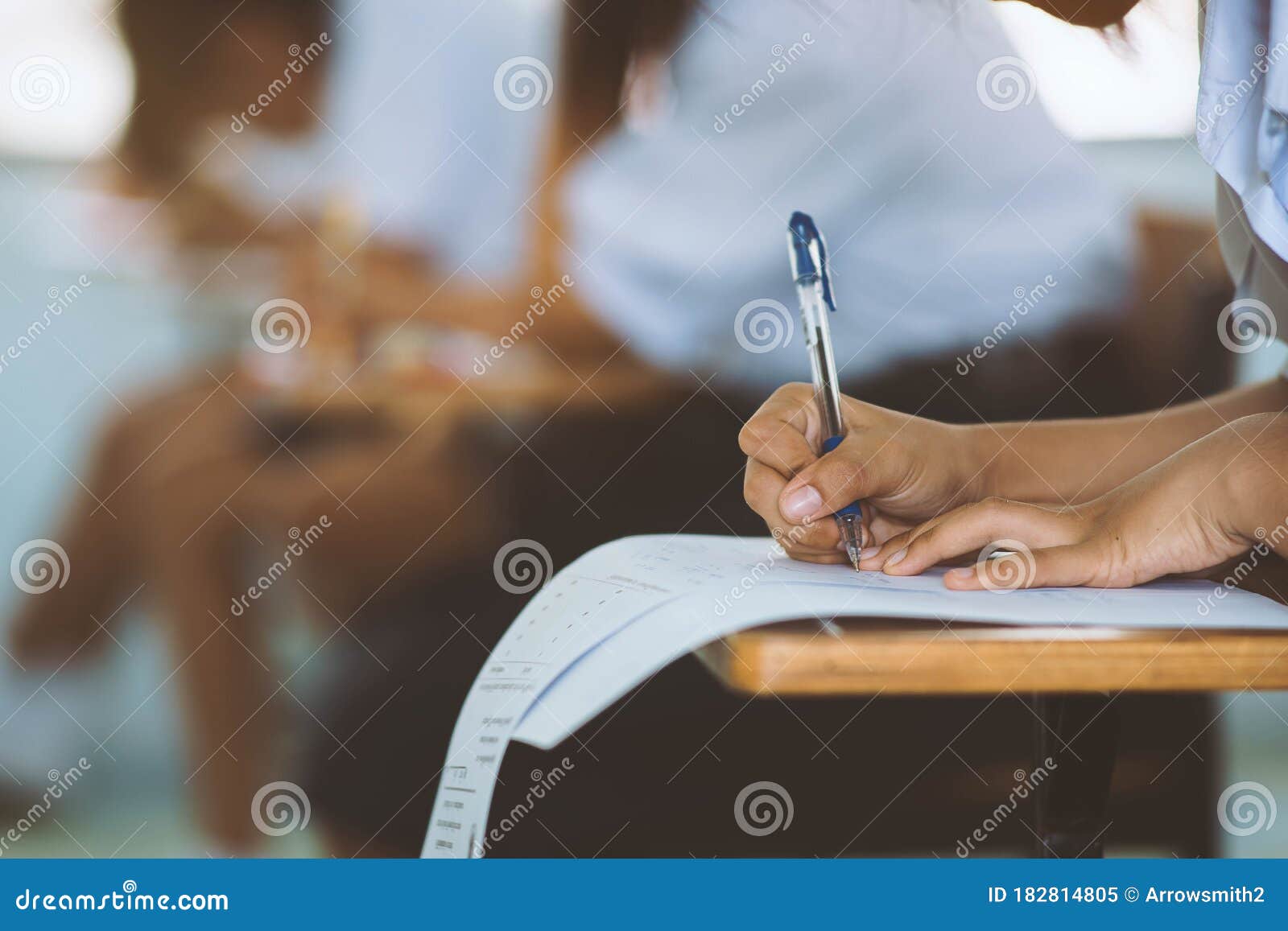 Close-up of Writing Hands of Uniform Students To Exam or Test in ...