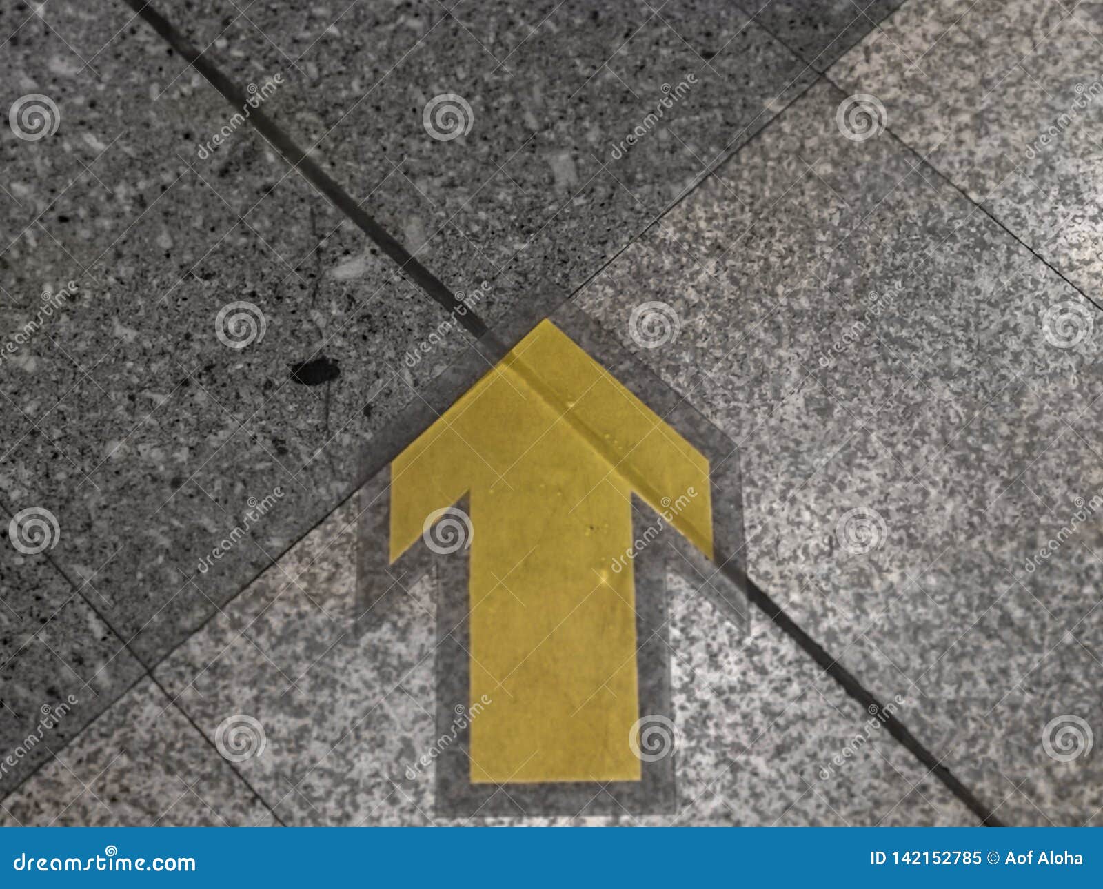 Close Up Yellow Arrow on Floor Ground. Stock Image - Image of close ...