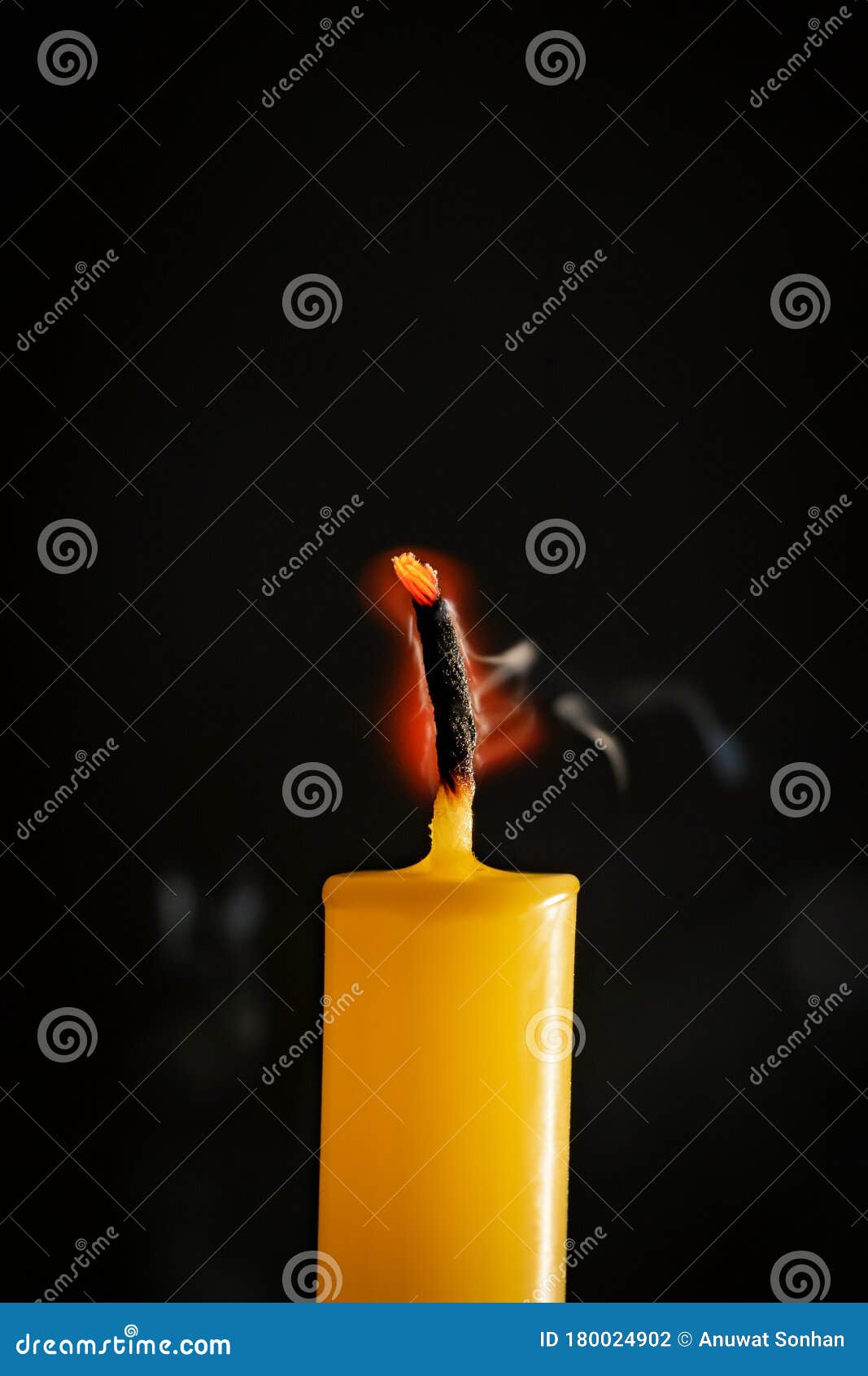 Close-up of Yellow Candles that are Extinguished and Smoke in a Black ...