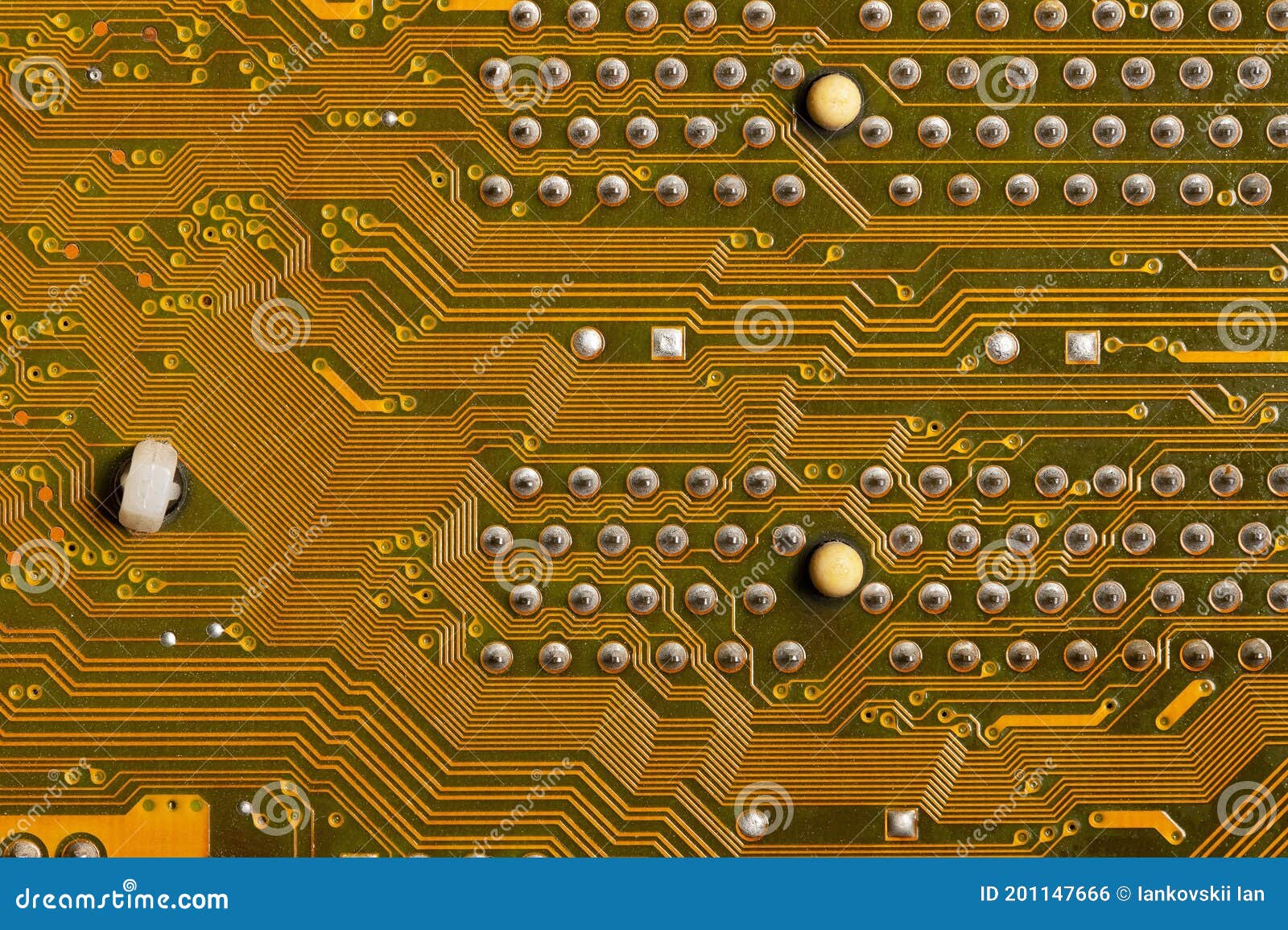 Close-up of a Yellow Circuit Board. the Reverse Side of the Motherboard ...