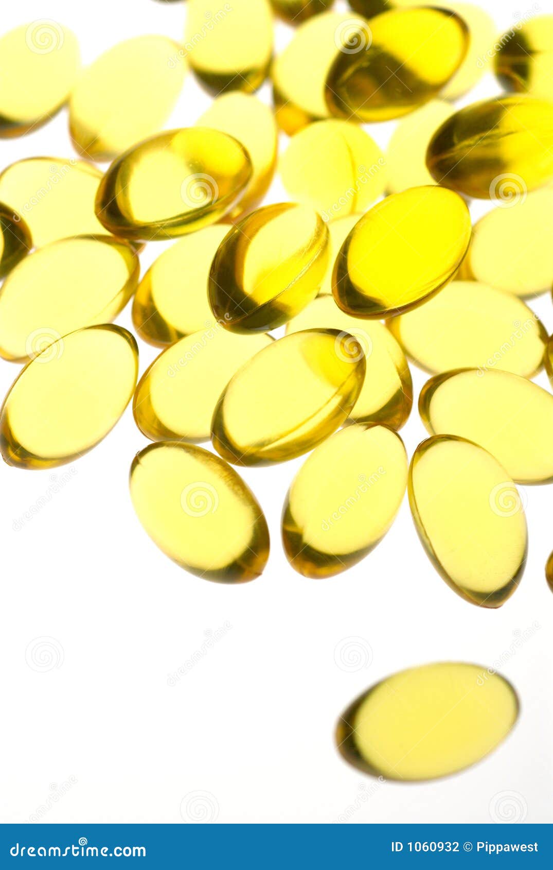 Close Up of Yellow Gel Capsules. Stock Photo - Image of long, nutrient ...