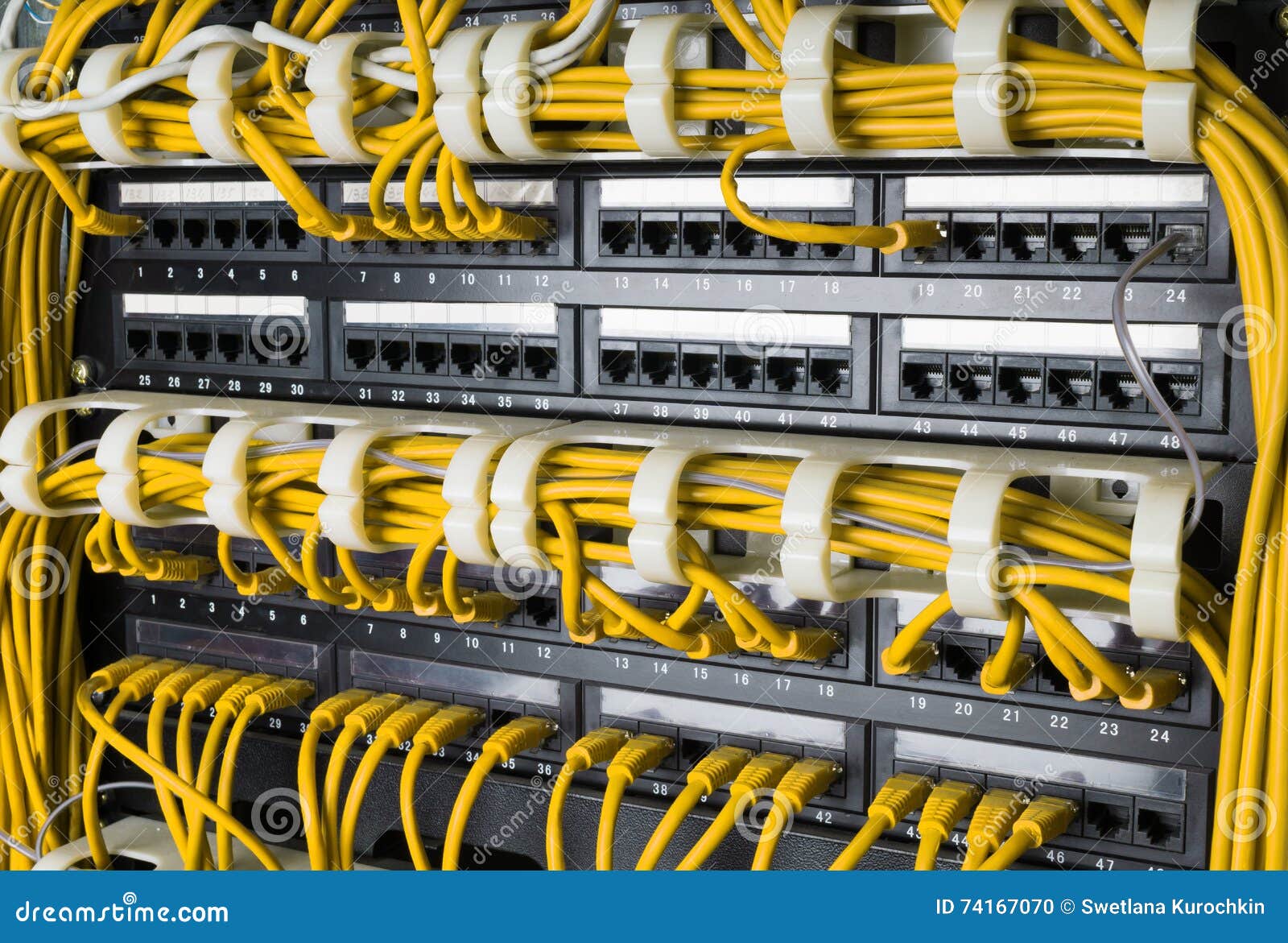 Close Up of Yellow Network Cables Connected To Switch Stock Photo ...