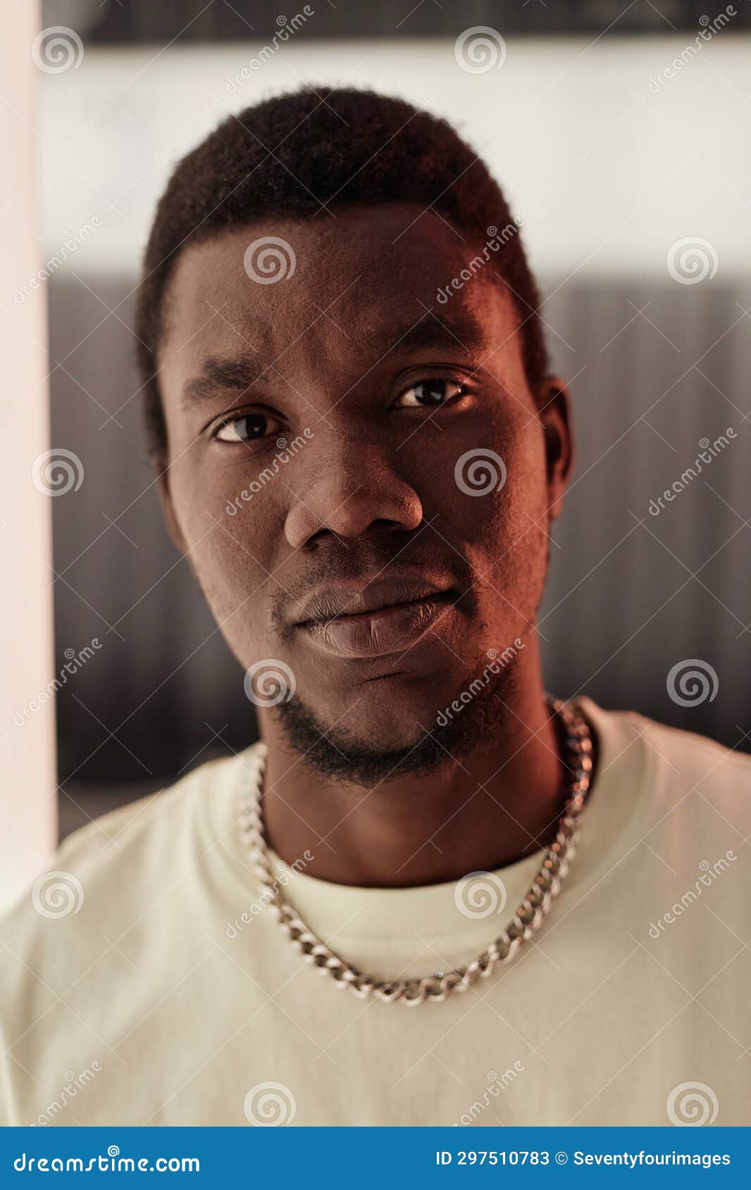 Close Up Young Black Man Looking at Camera with Serious Face Expression ...