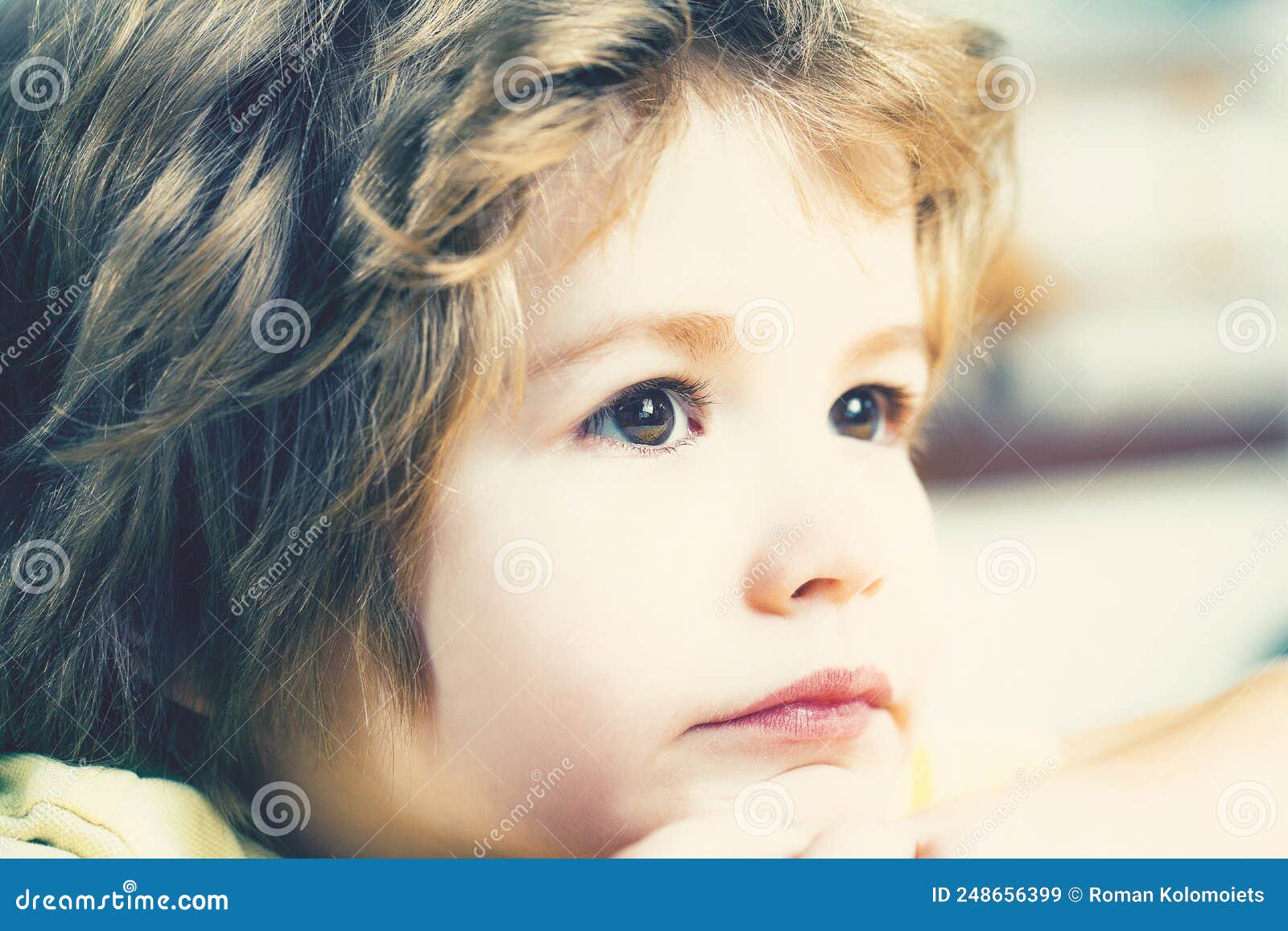 A Close Up of a Young Boy with a Serious Look of Concern. Stock Image ...