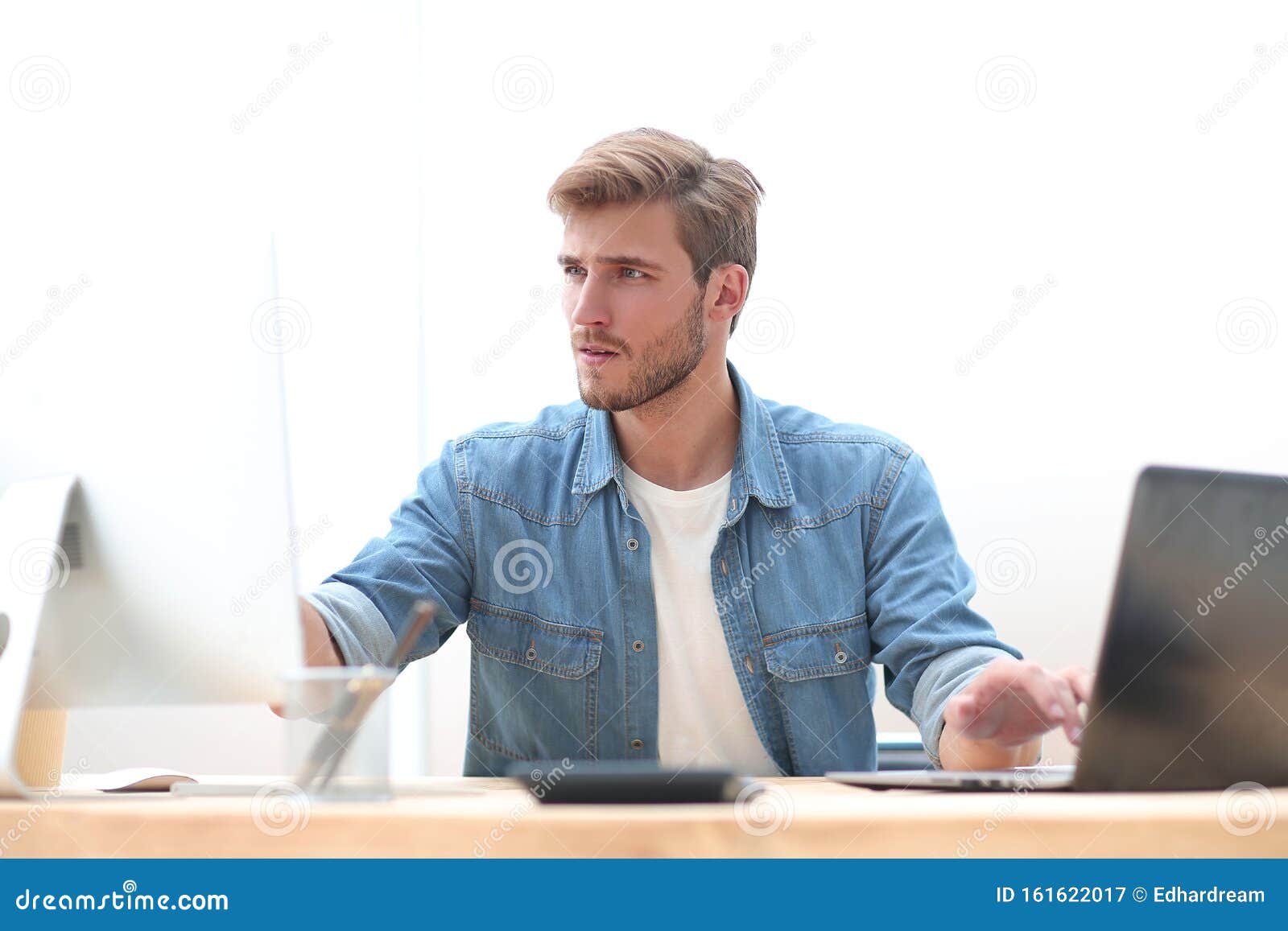 Close Up. Young Businessman Sitting at a Computer Table Stock Image ...
