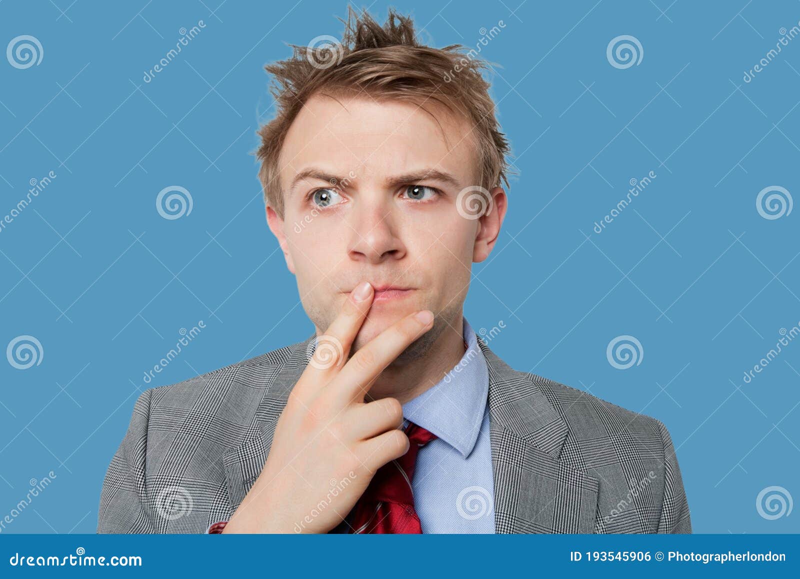Close-up of Young Businessman Thinking Hard Stock Photo - Image of ...