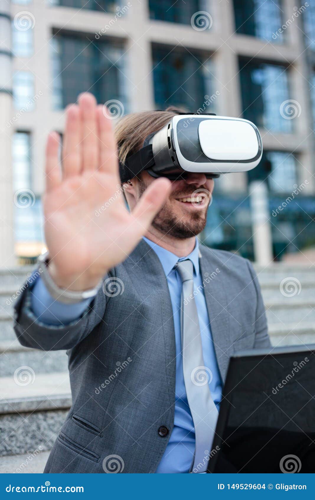 Close Up of a Young Businessman Using VR Goggles in Front of an Office ...