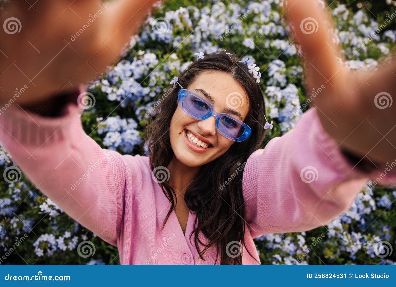Close Up Young Caucasian Girl Smiling Teeth Looking At Camera On