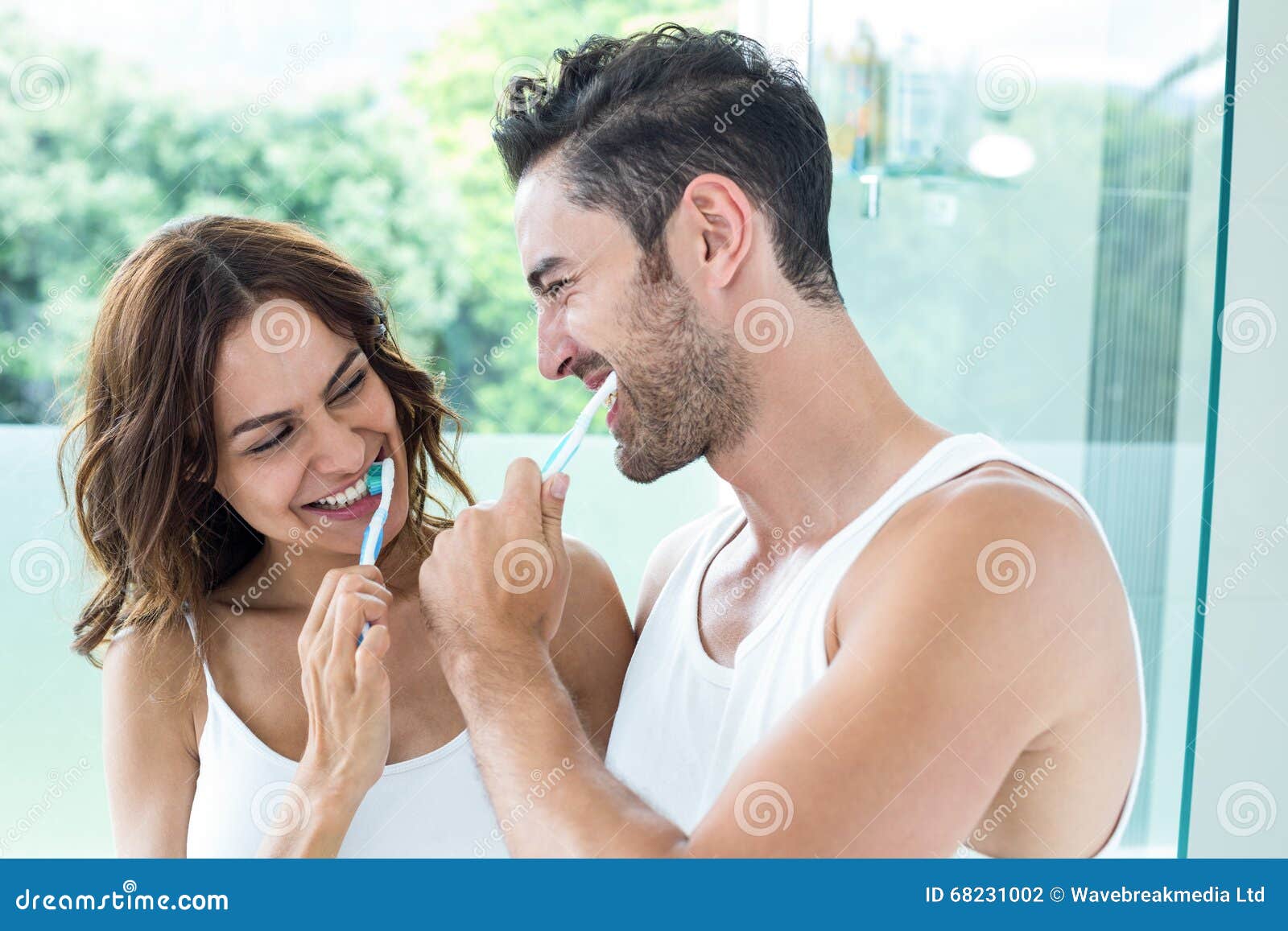 Close-up of Young Couple Brushing Teeth Stock Photo - Image of home ...
