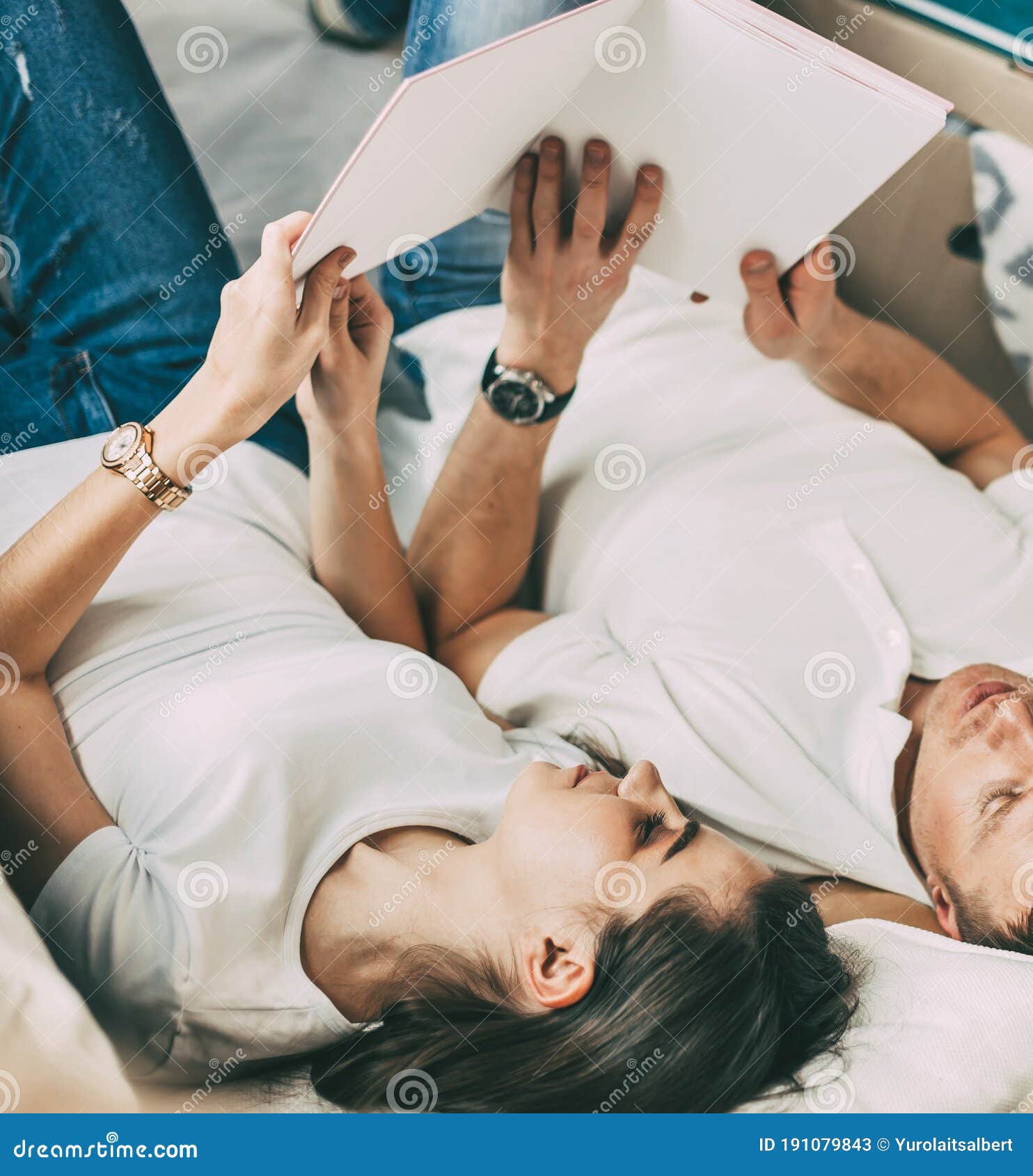 Young Couple is Discussing the Design for Their New Apartment. Stock ... Young Couple is Discussing the Design for Their New Apartment. Stock ...