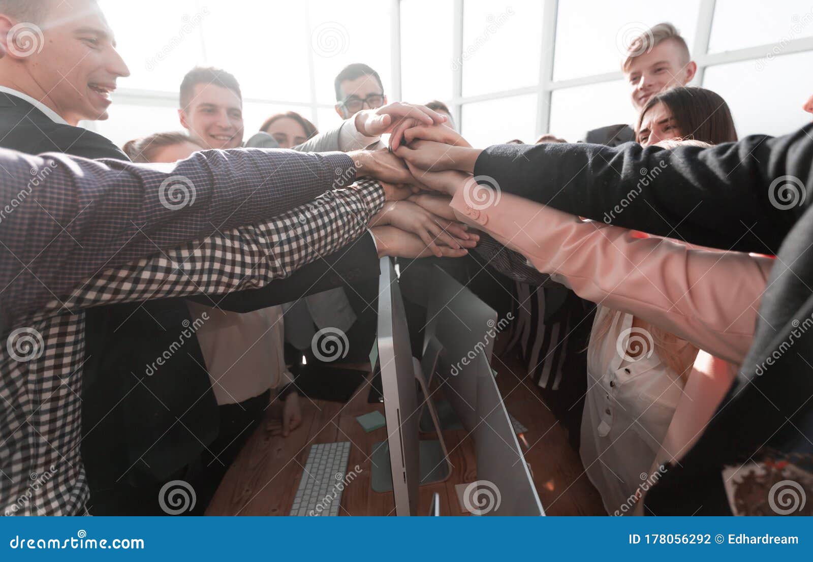 Close Up. Young Employees with a Gesture of Showing Their Unity Stock ...