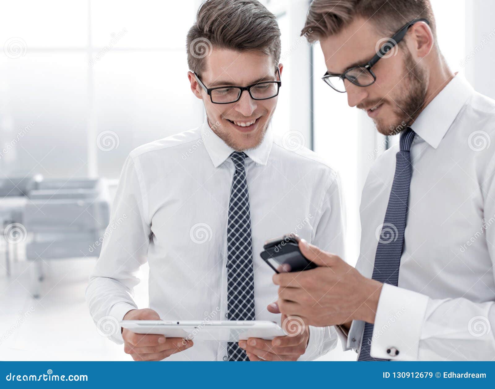 Close Up.young Employees Use Gadgets in Their Office Stock Image ...