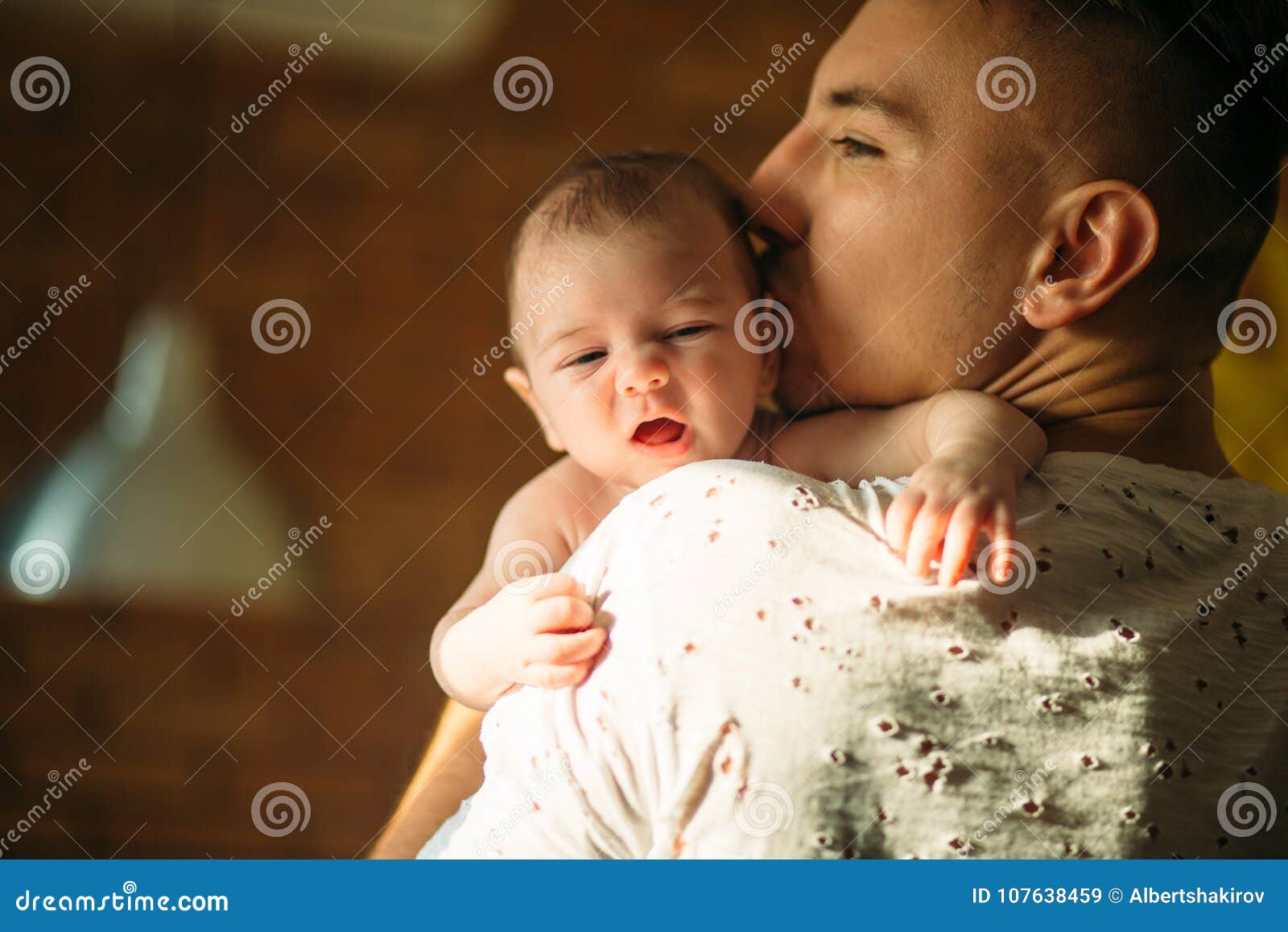 Young Father Holding His Newborn Baby Son Stock Image - Image of adult ... Young Father Holding His Newborn Baby Son Stock Image - Image of adult ...
