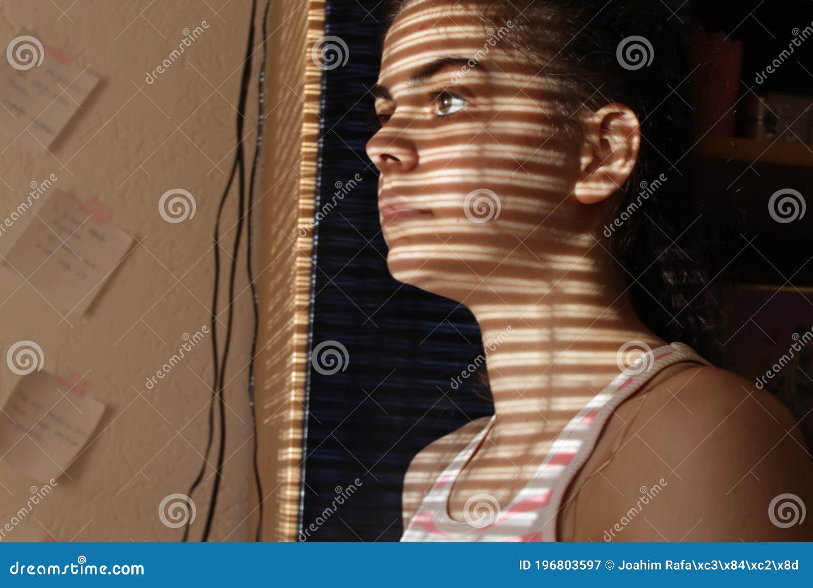 Close-up of a Young Girl`s Face Looking Out the Window Stock Image ...