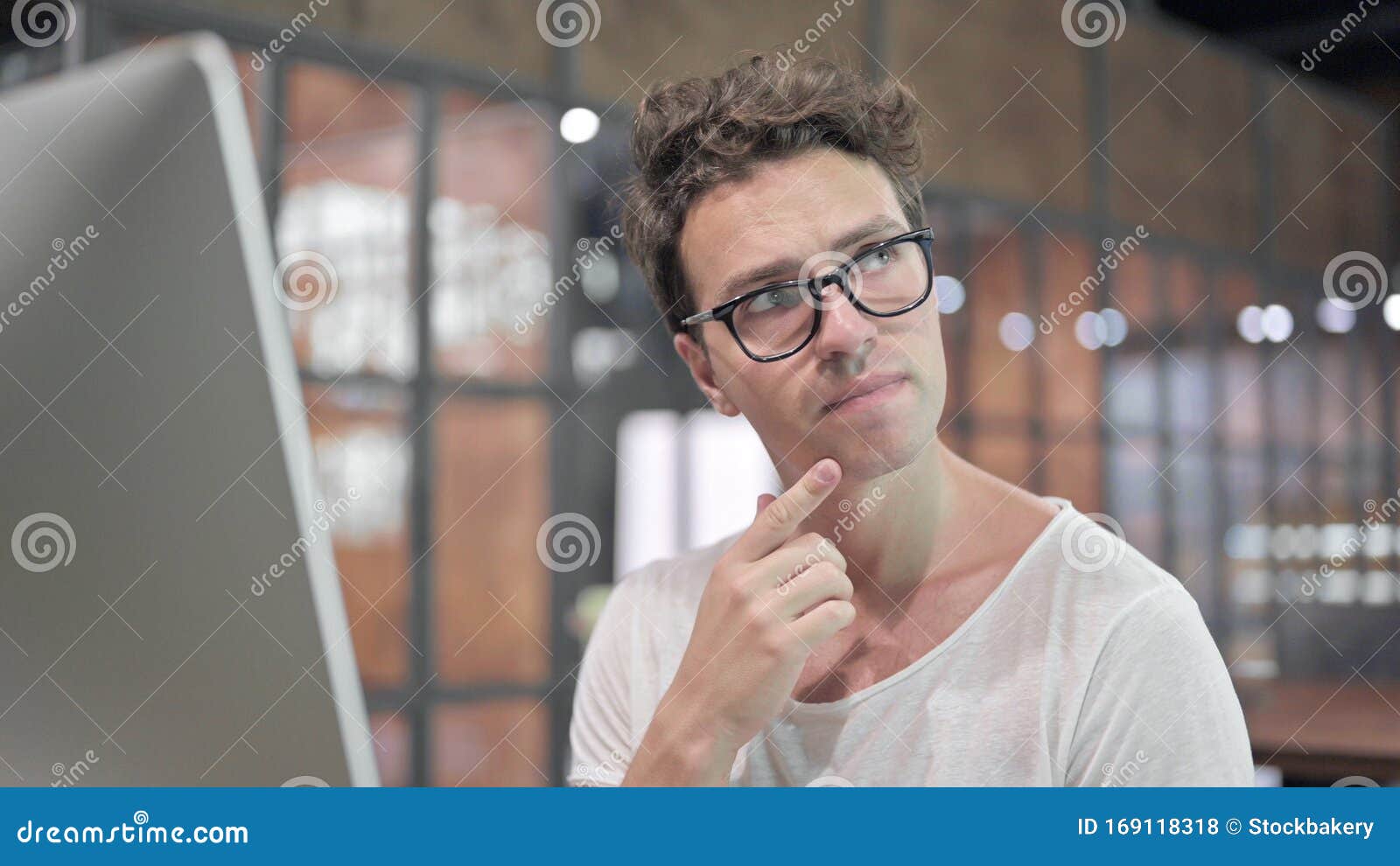 Close Up of Young Guy Think and Working on Computer Stock Photo - Image ...