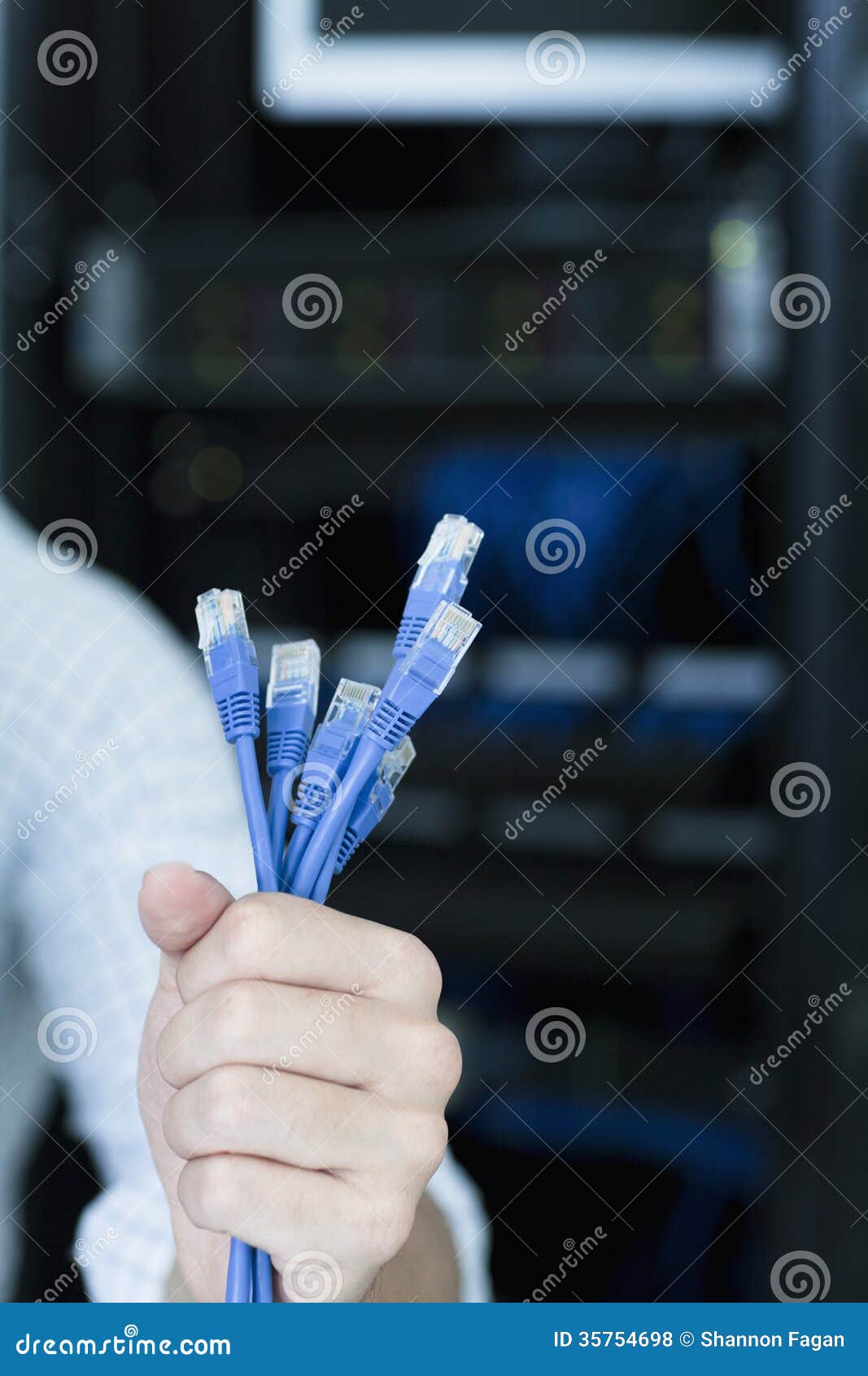Close Up of Young Man Holding a Bunch of Computer Cables Stock Photo ...