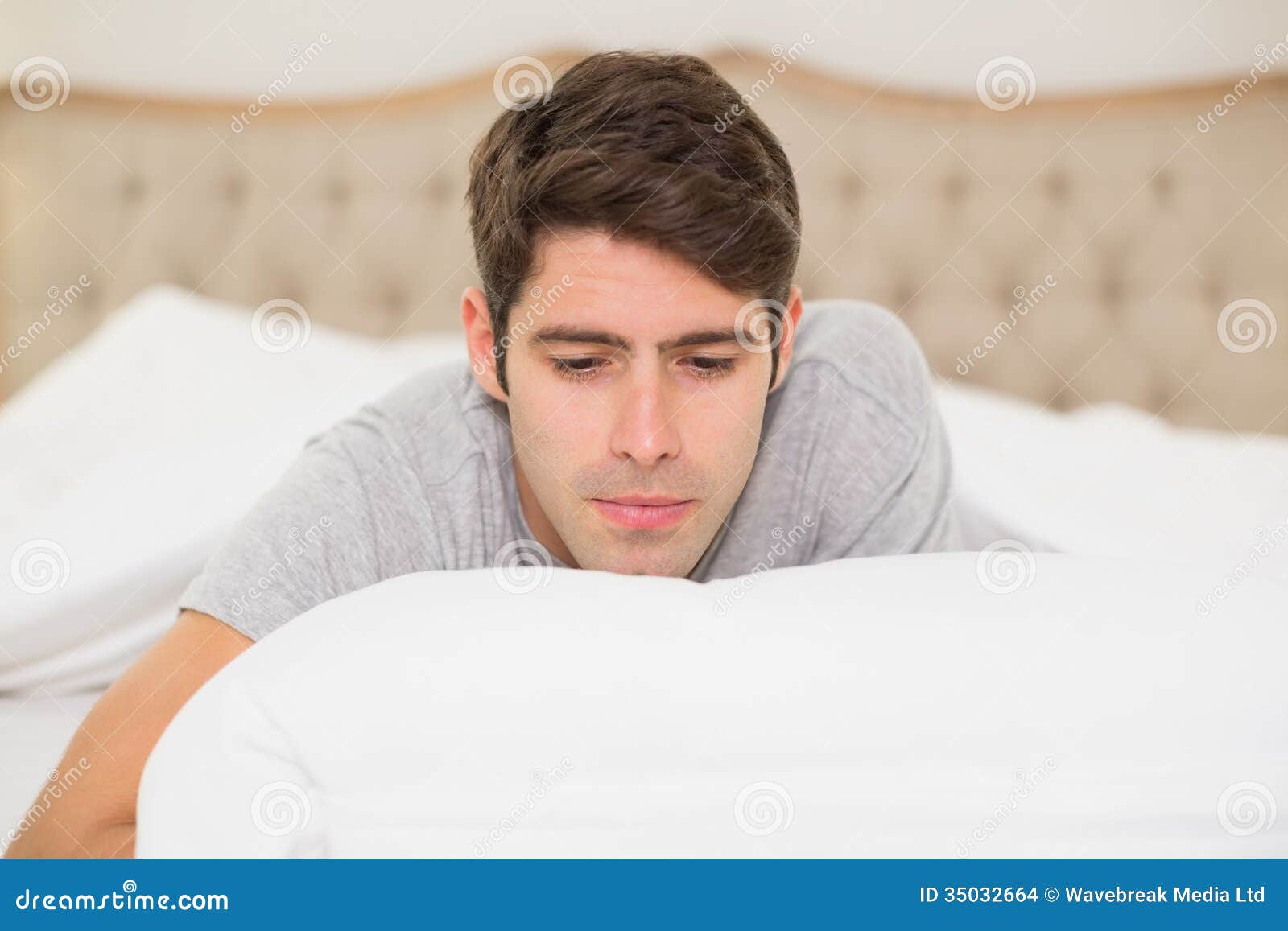 Close Up of a Young Man Resting in Bed Stock Photo - Image of front ...