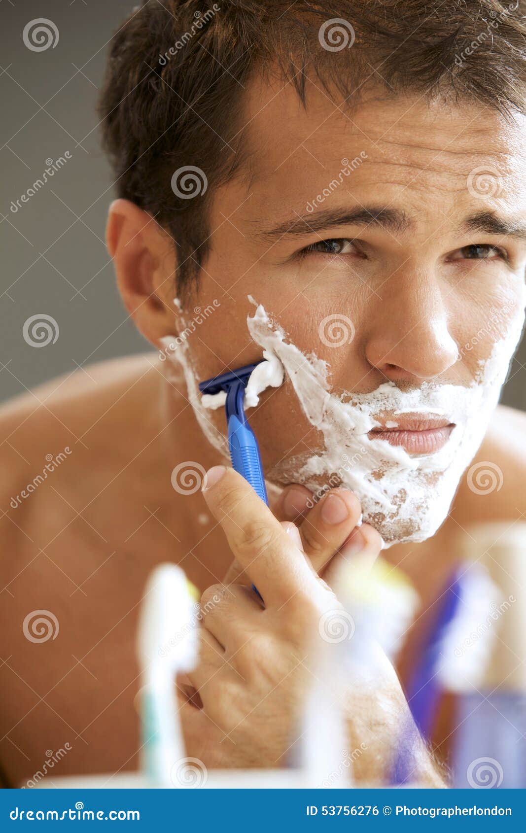 Close-up of a Young Man Shaving His Face Stock Photo - Image of ...