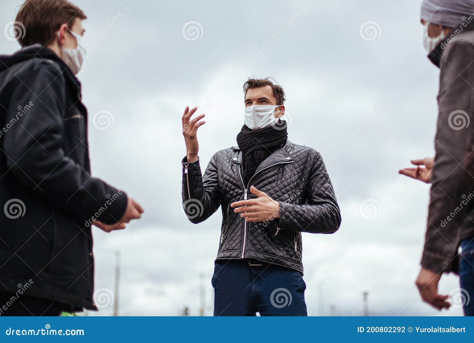 Young People in Protective Masks Talk Standing at a Safe Distance Stock ...