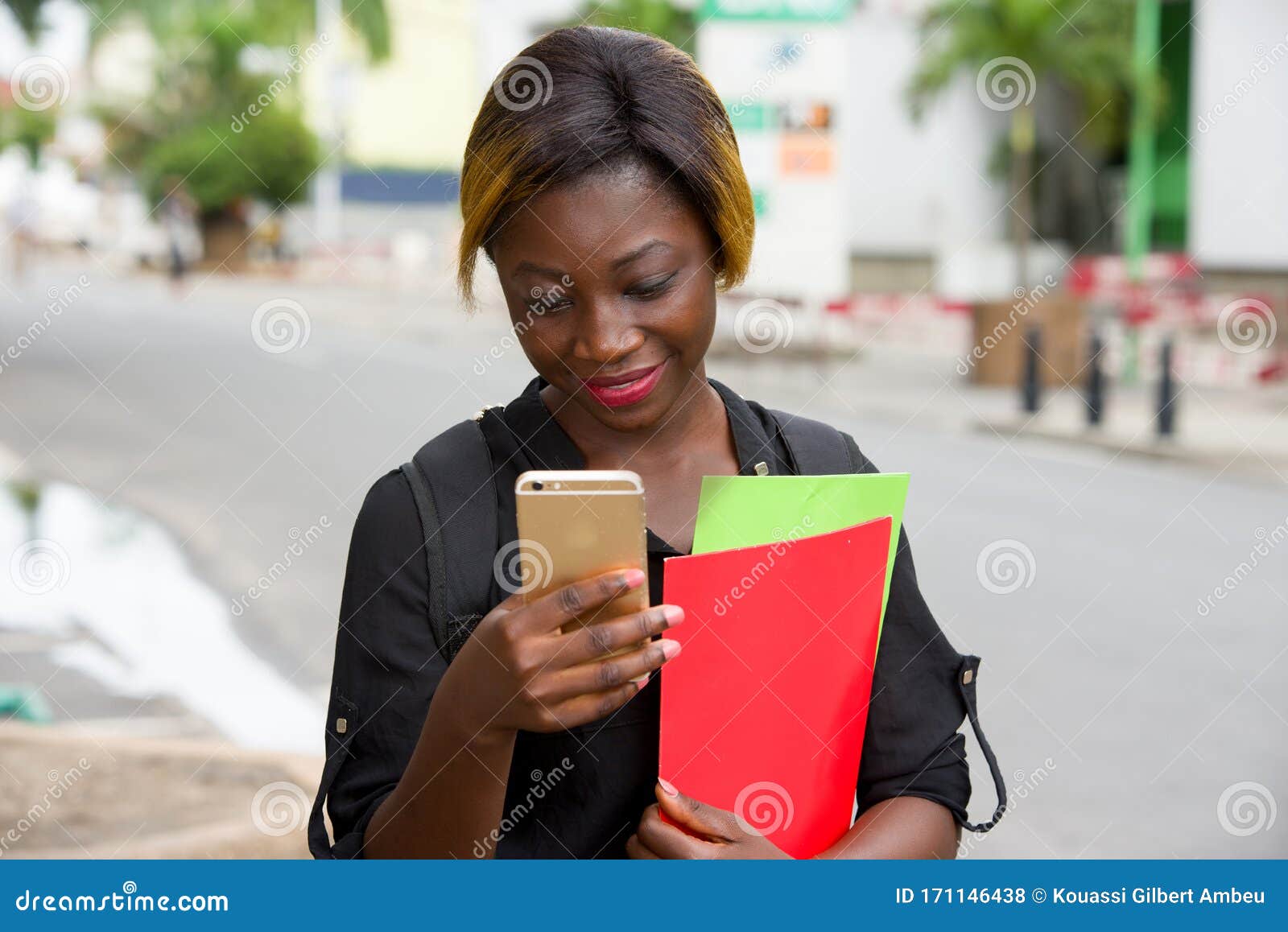 Close Up of Young Student with Mobile Phone, Smiling Stock Photo ...