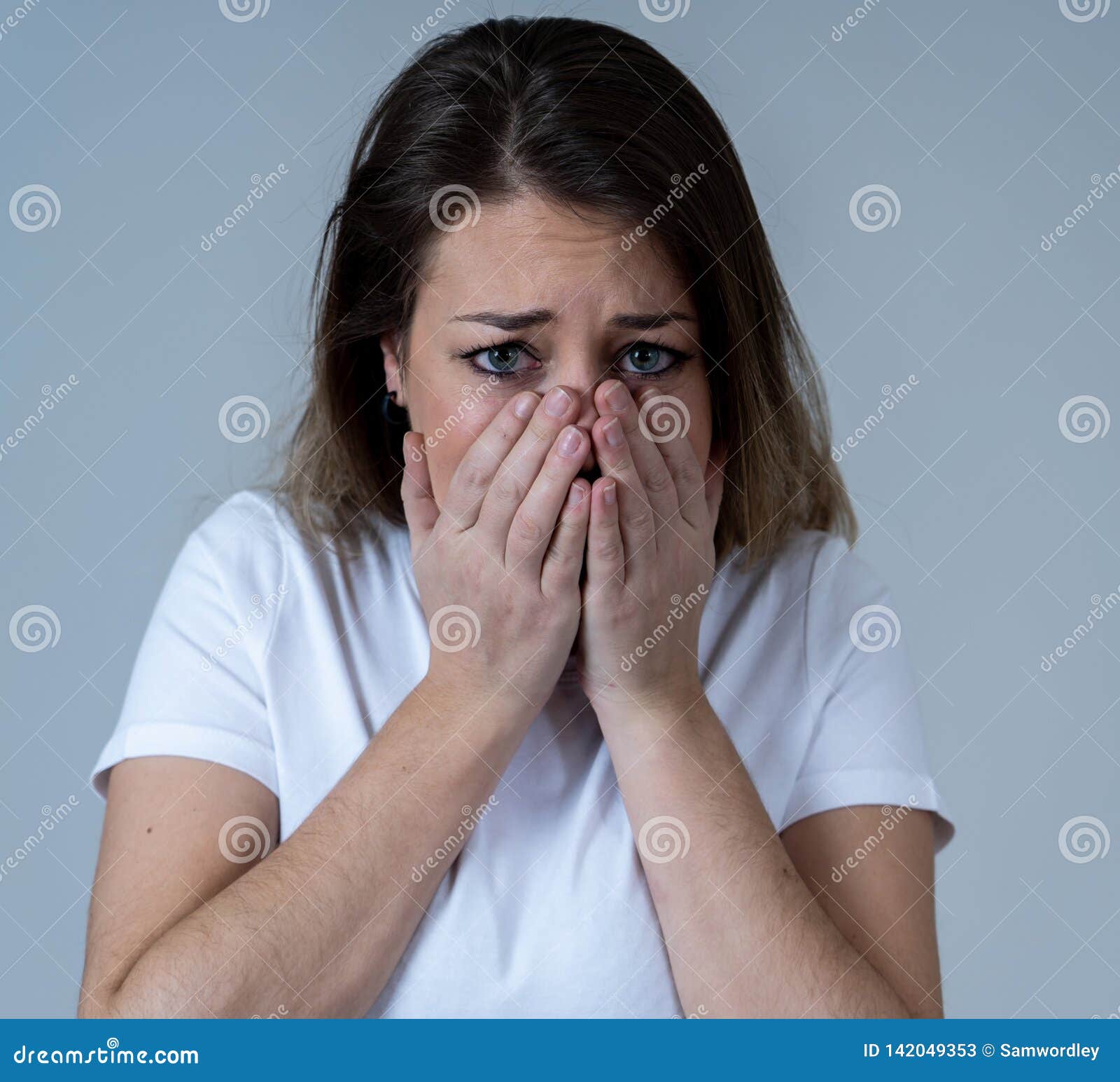 Portrait Of A Young Attractive Woman Looking Scared And Shocked Human