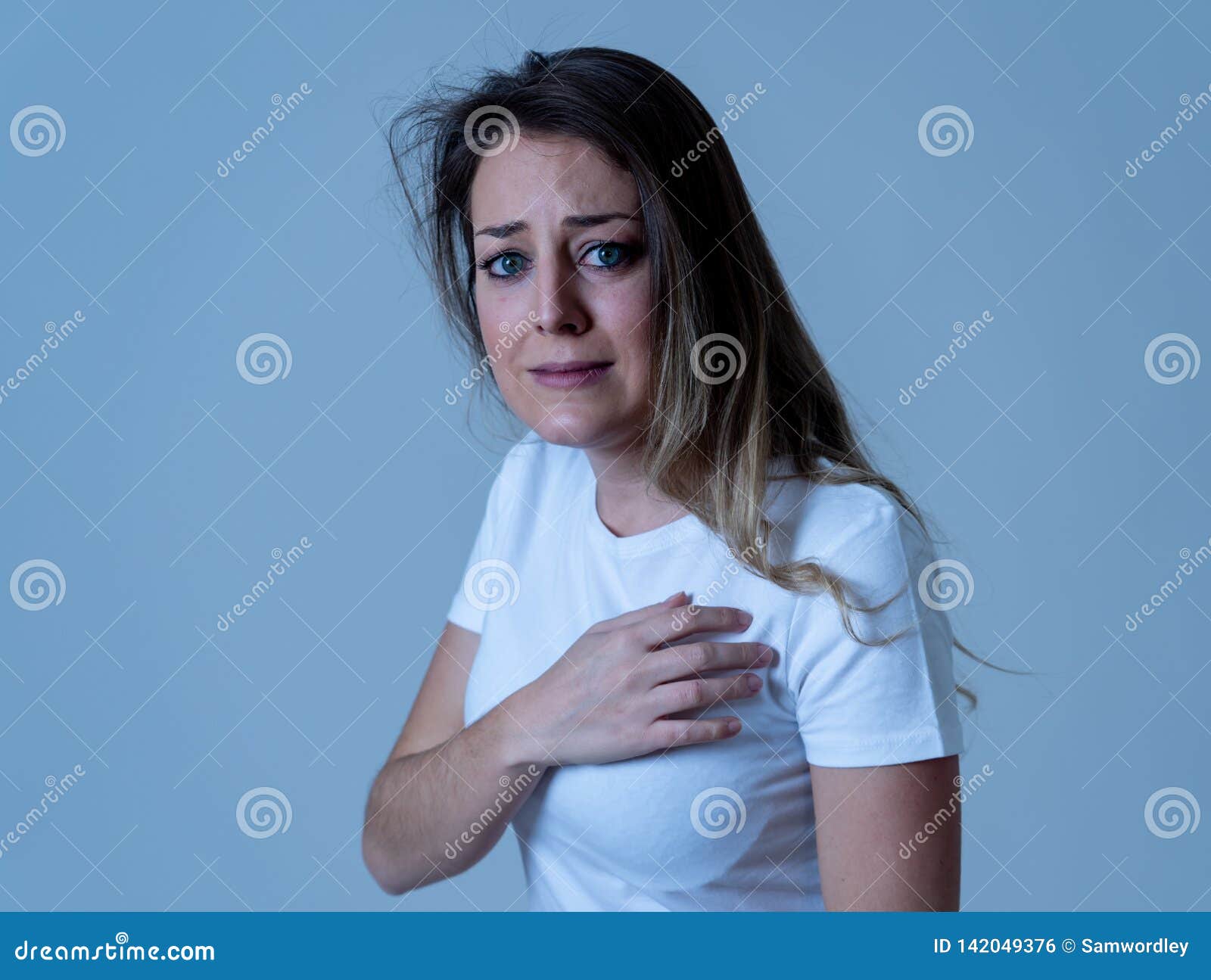 Portrait Of A Young Attractive Woman Looking Scared And Shocked Human