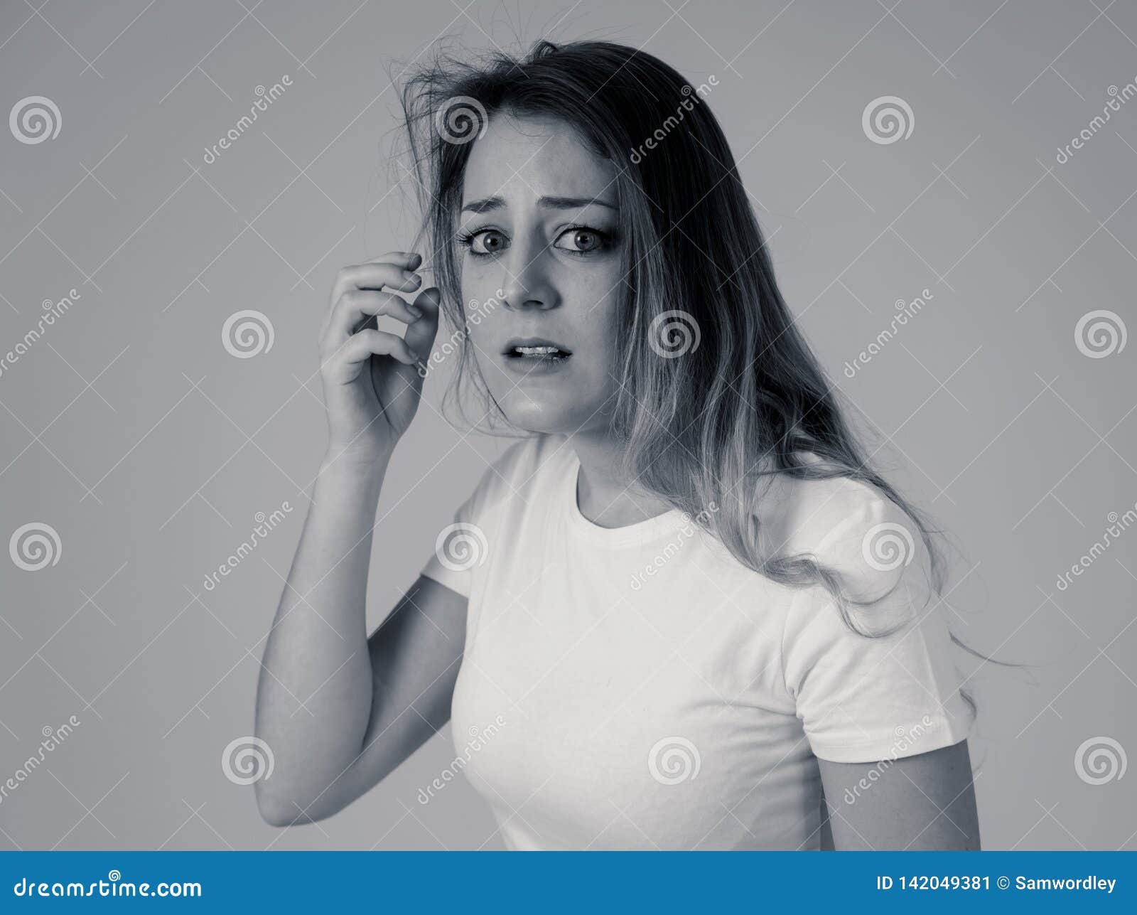 Portrait Of A Young Attractive Woman Looking Scared And Shocked Human