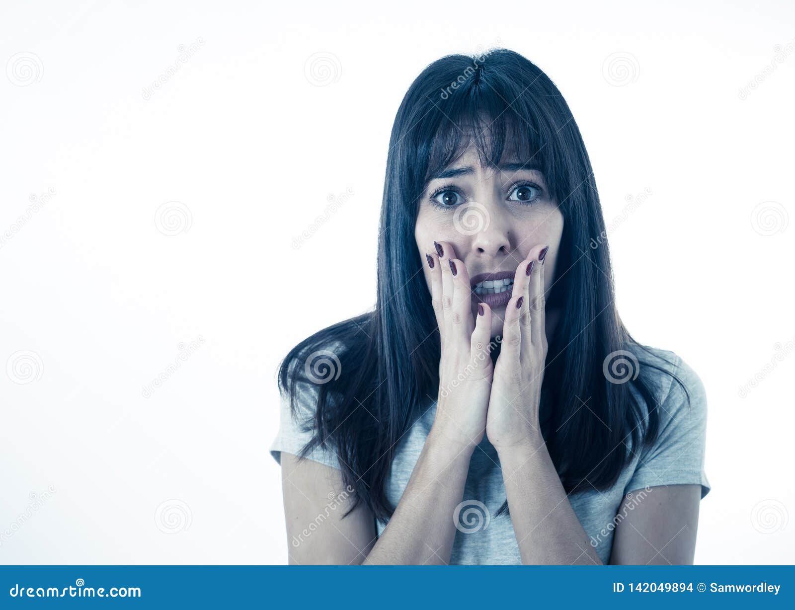 Portrait Of A Young Attractive Woman Looking Scared And Shocked Human