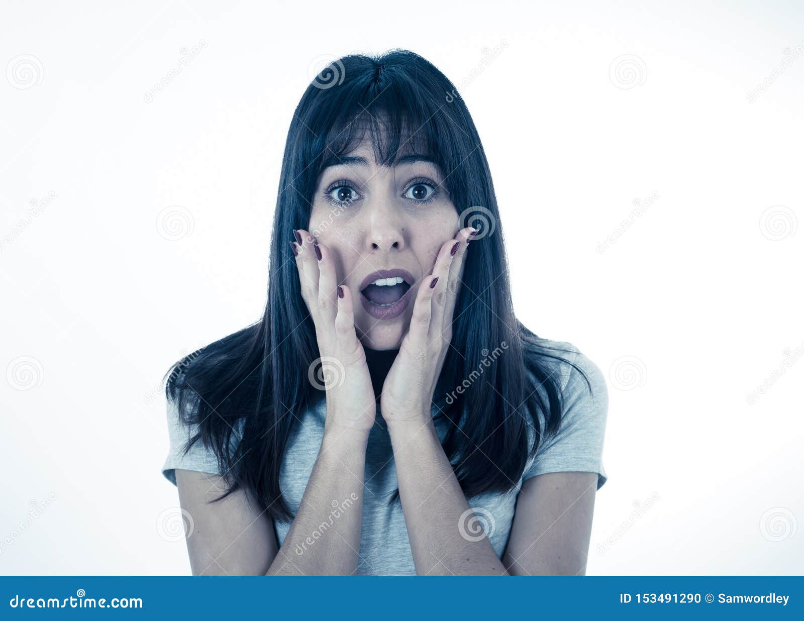 Portrait Of A Young Attractive Woman Looking Scared And Shocked Human
