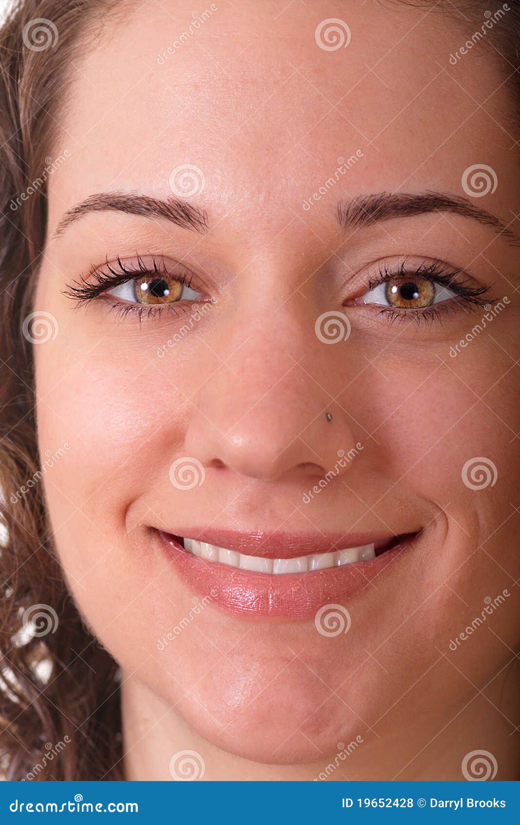 Close-up of Young Woman Smiling with Bright Eyes Stock Photo - Image of ...